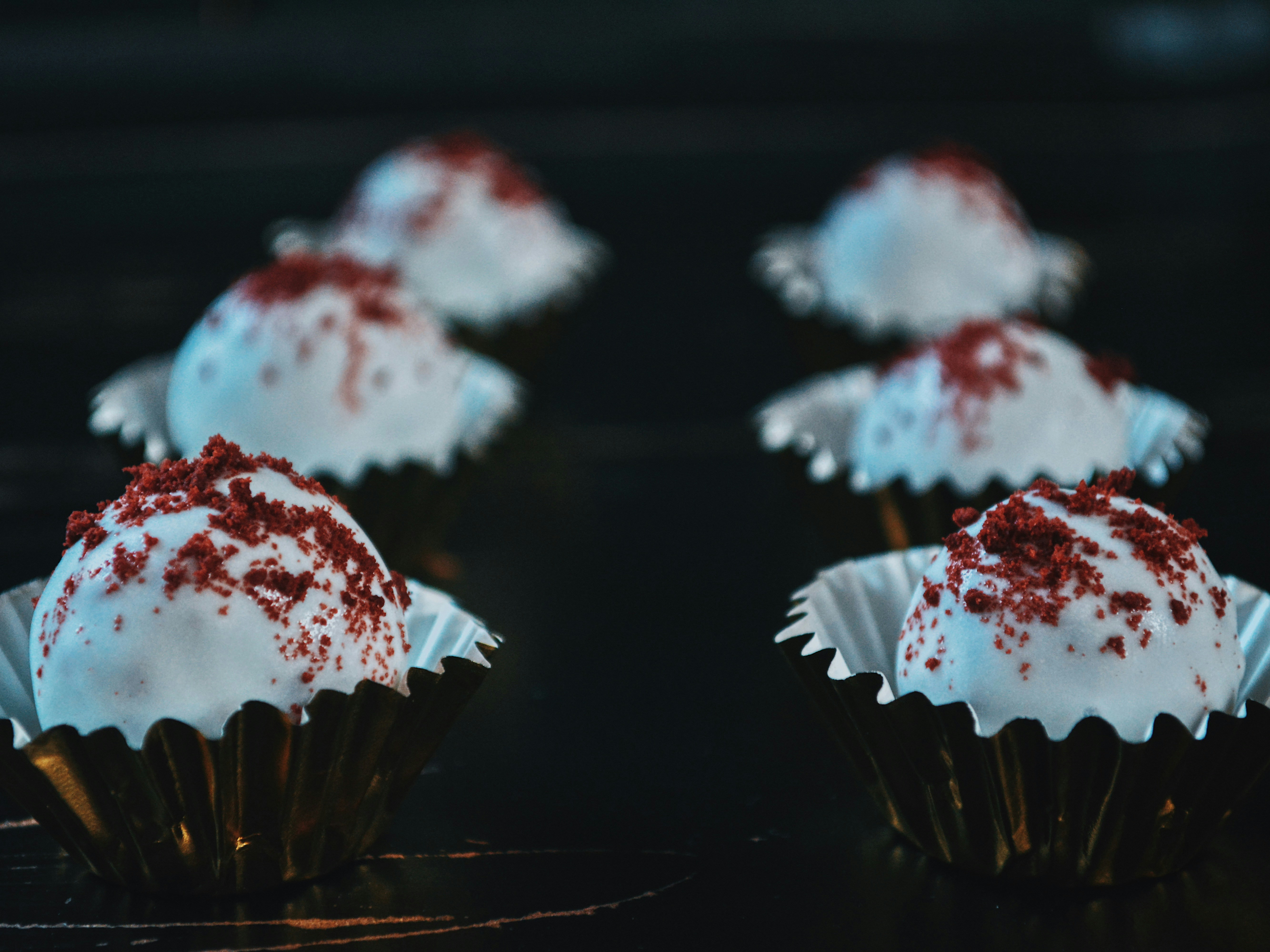 Snow-Topped Cupcakes in Velvet Darkness