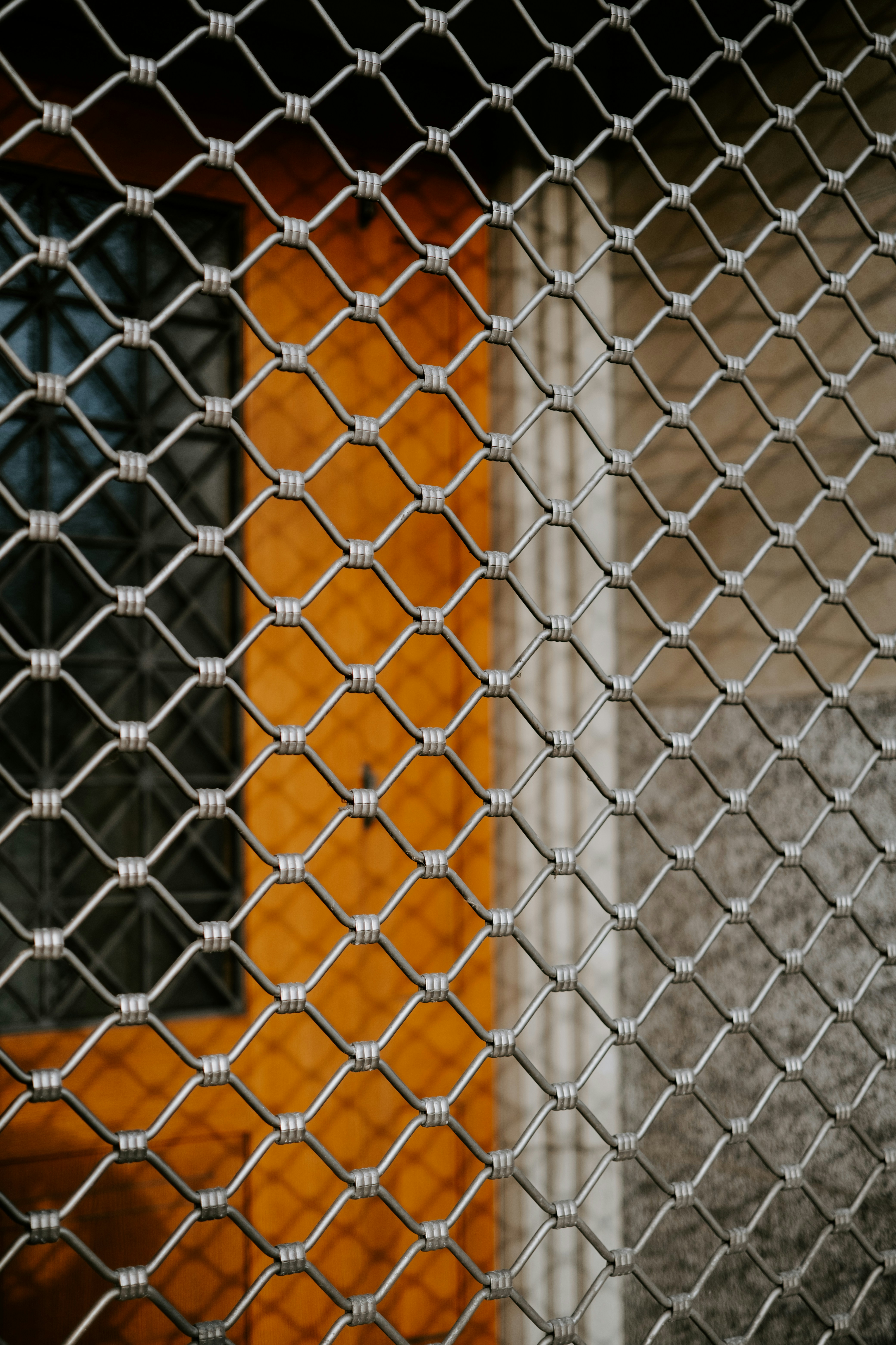 A close-up of a chain link fence photo – Free Brown Image on Unsplash