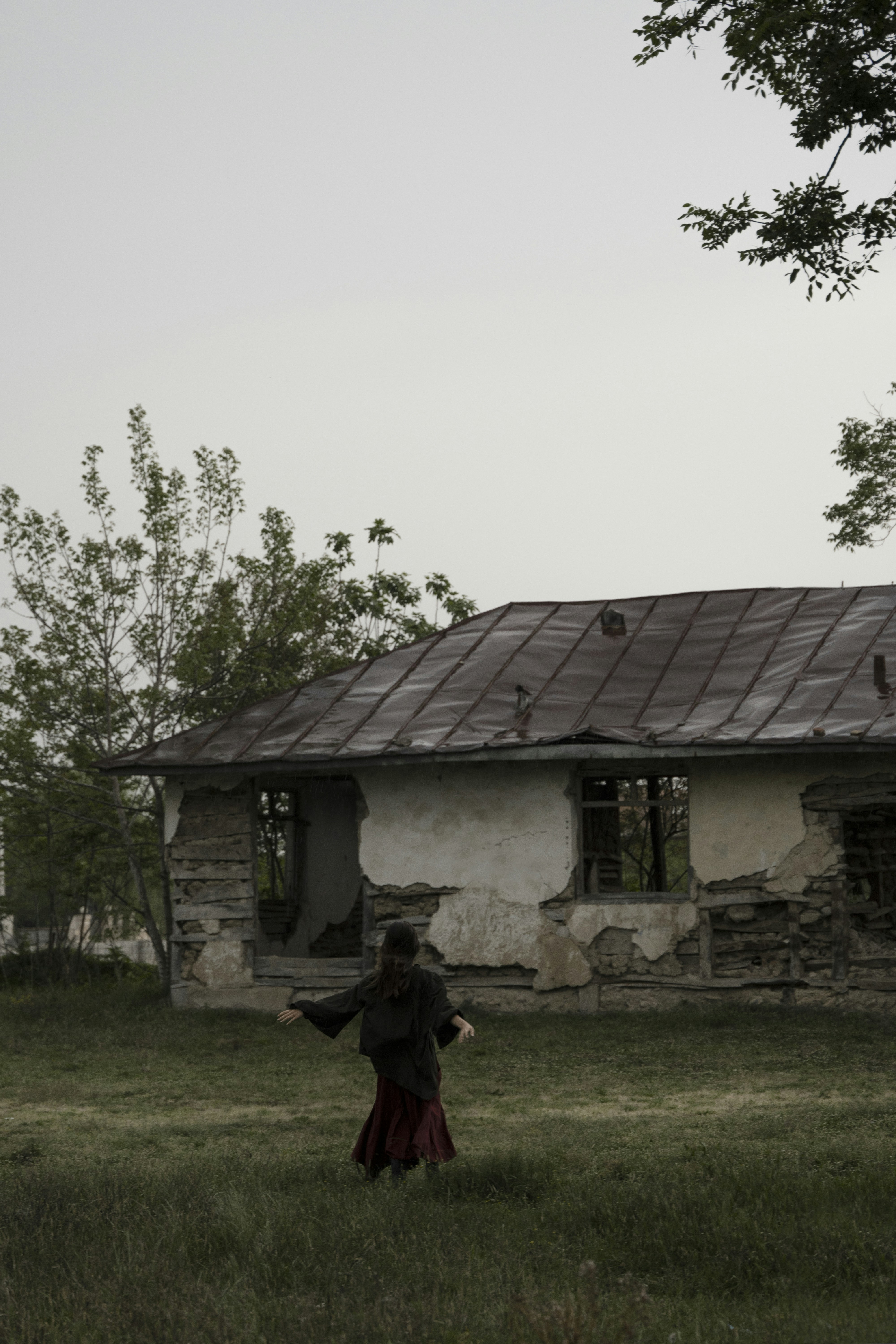 Waltz Among the Ruins: A Quiet Moment by the Crumbling House