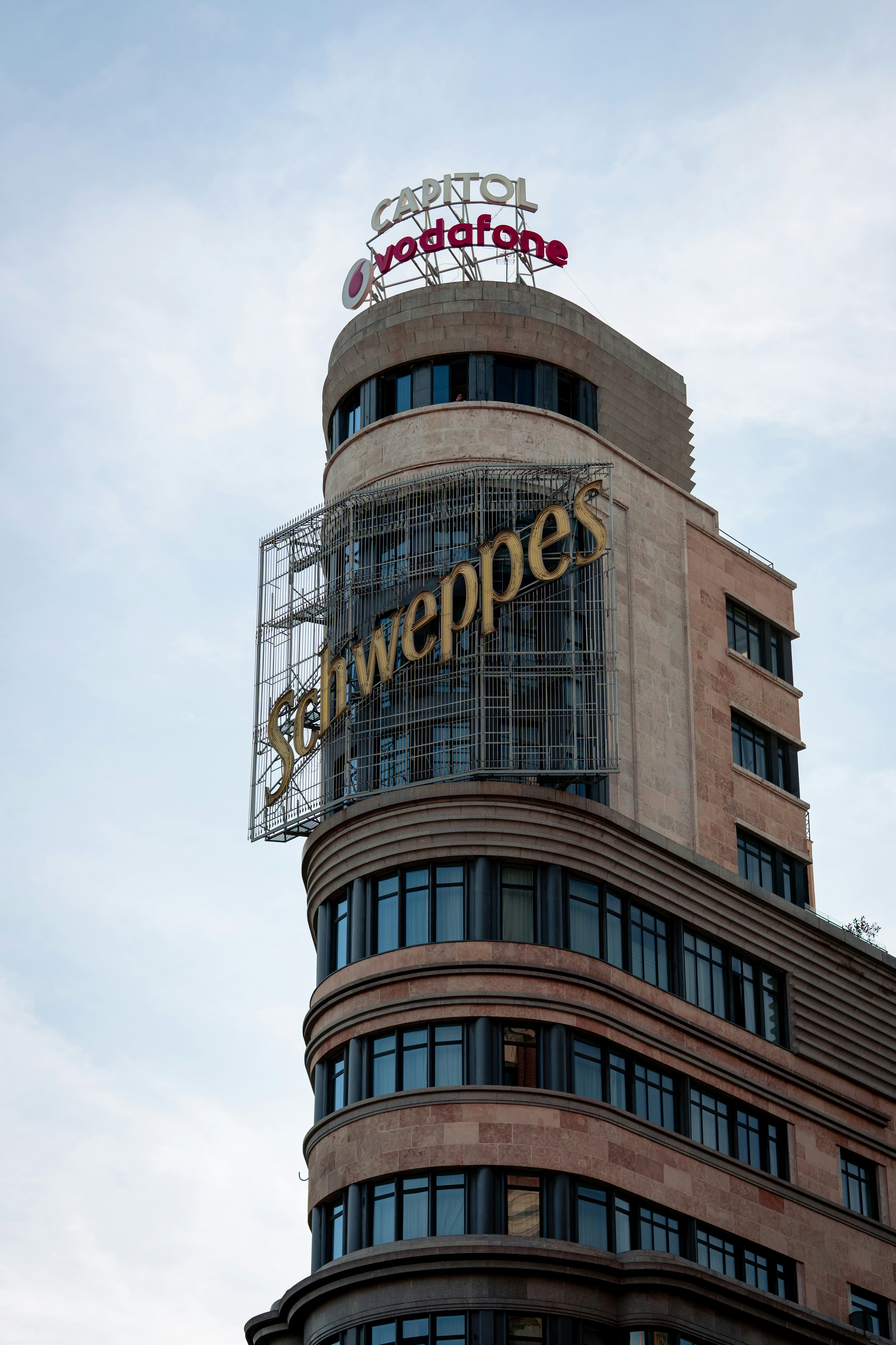 a tall building with a sign on it