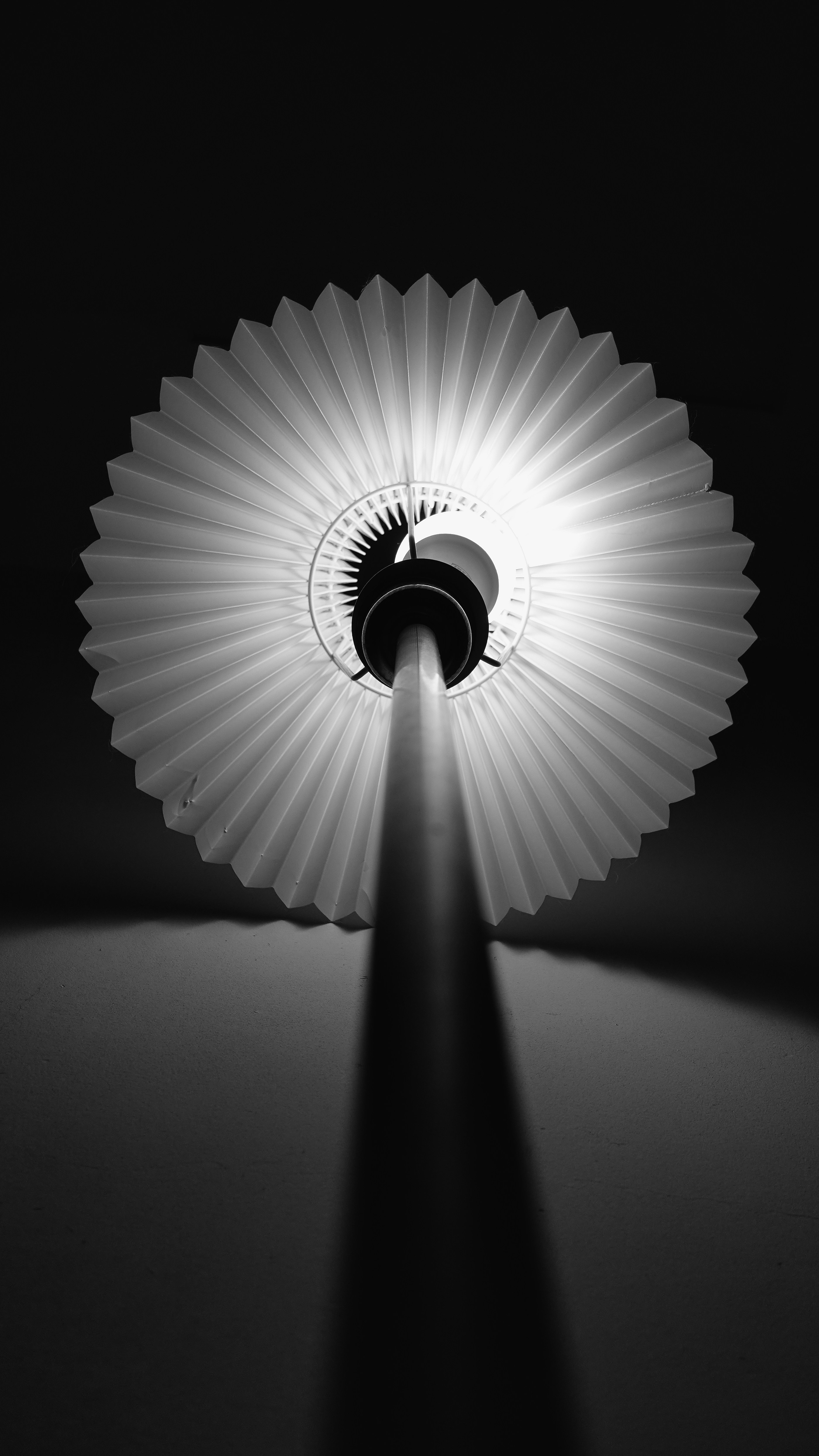 Radial Halo: The Pleated Shade Reaching Up Through Darkness