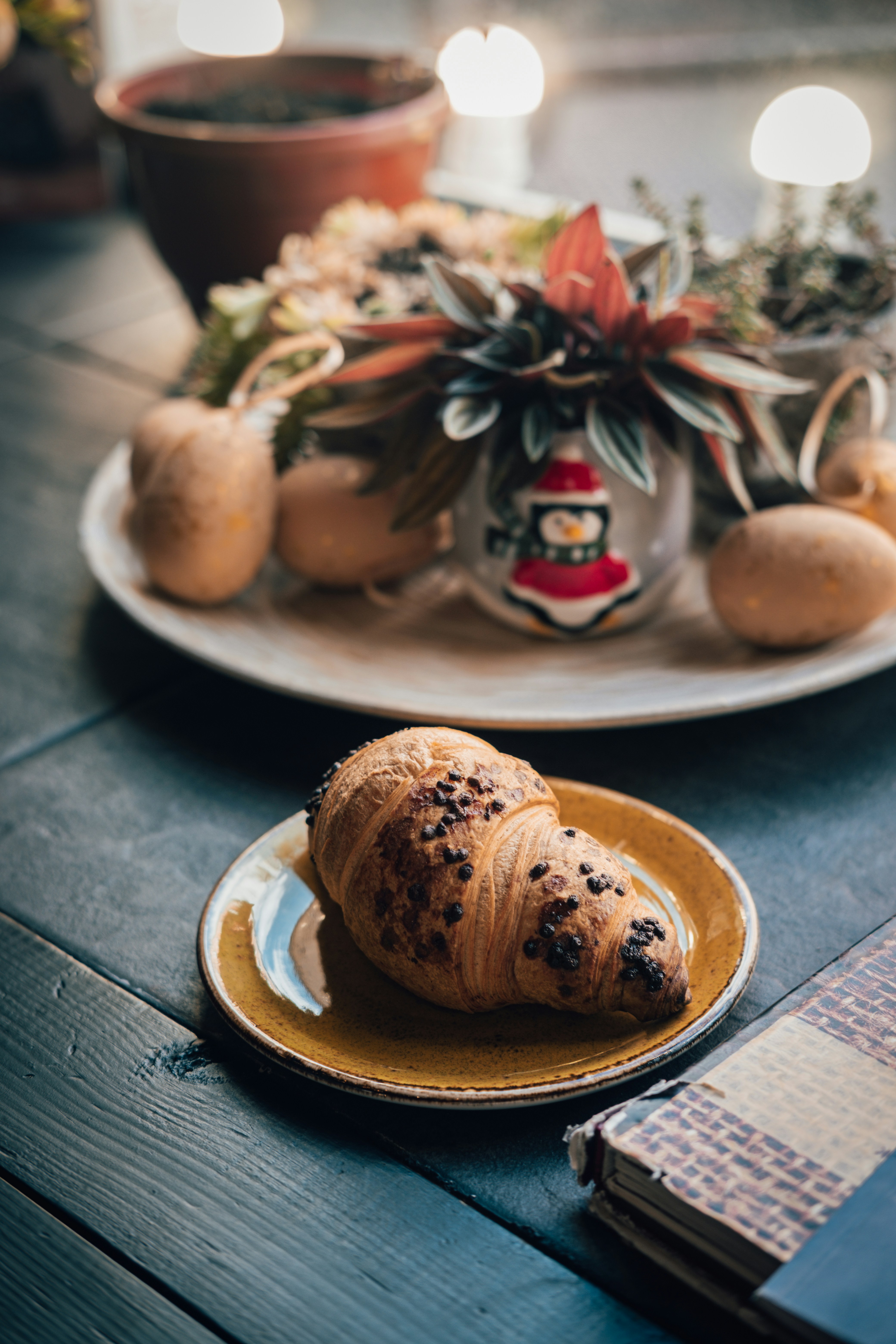 Croissant in Warm Focus: A Cozy Holiday Tabletop Still Life