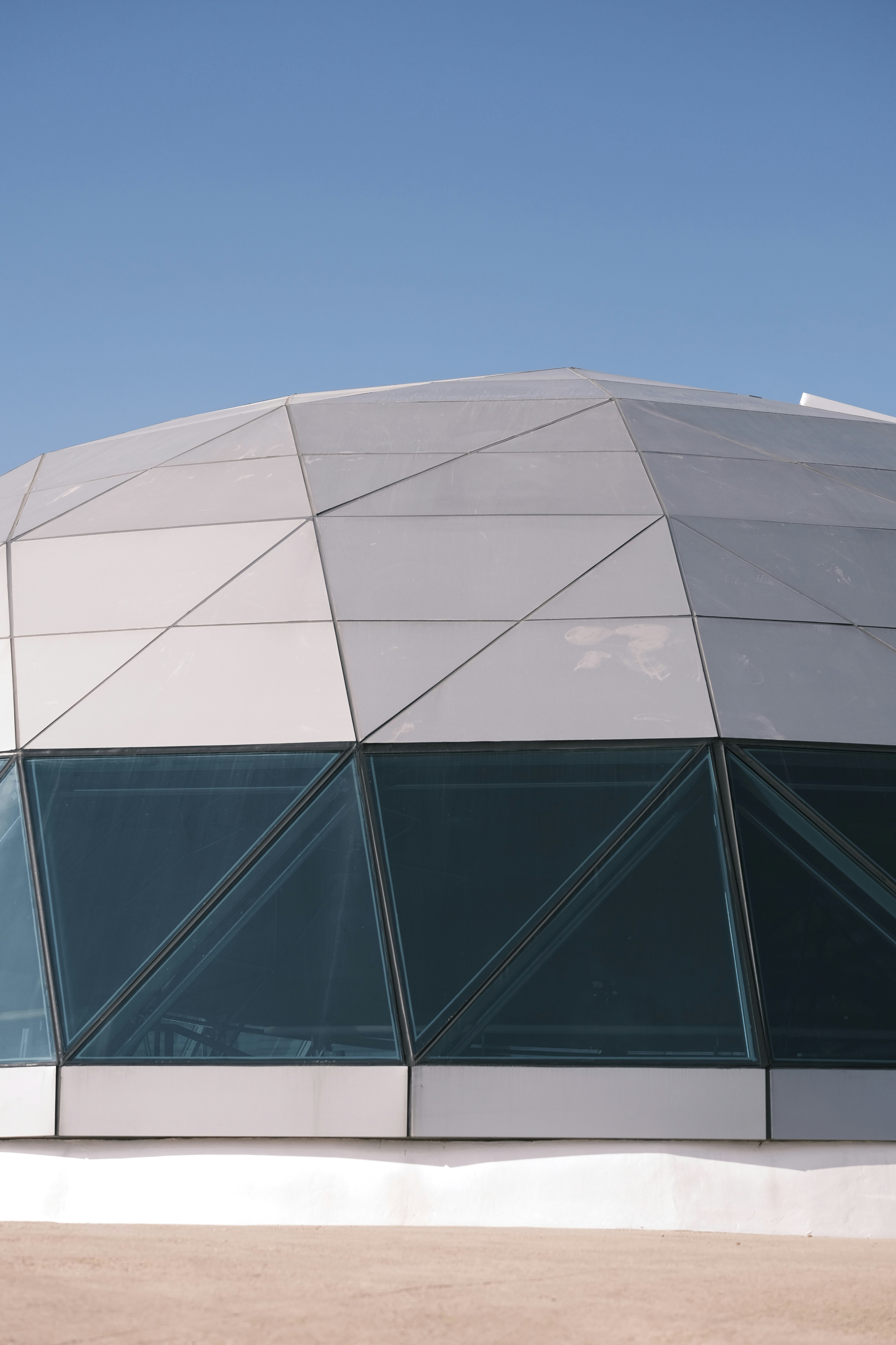 The Dome’s Faceted Crown Beneath a Clear Blue Sky