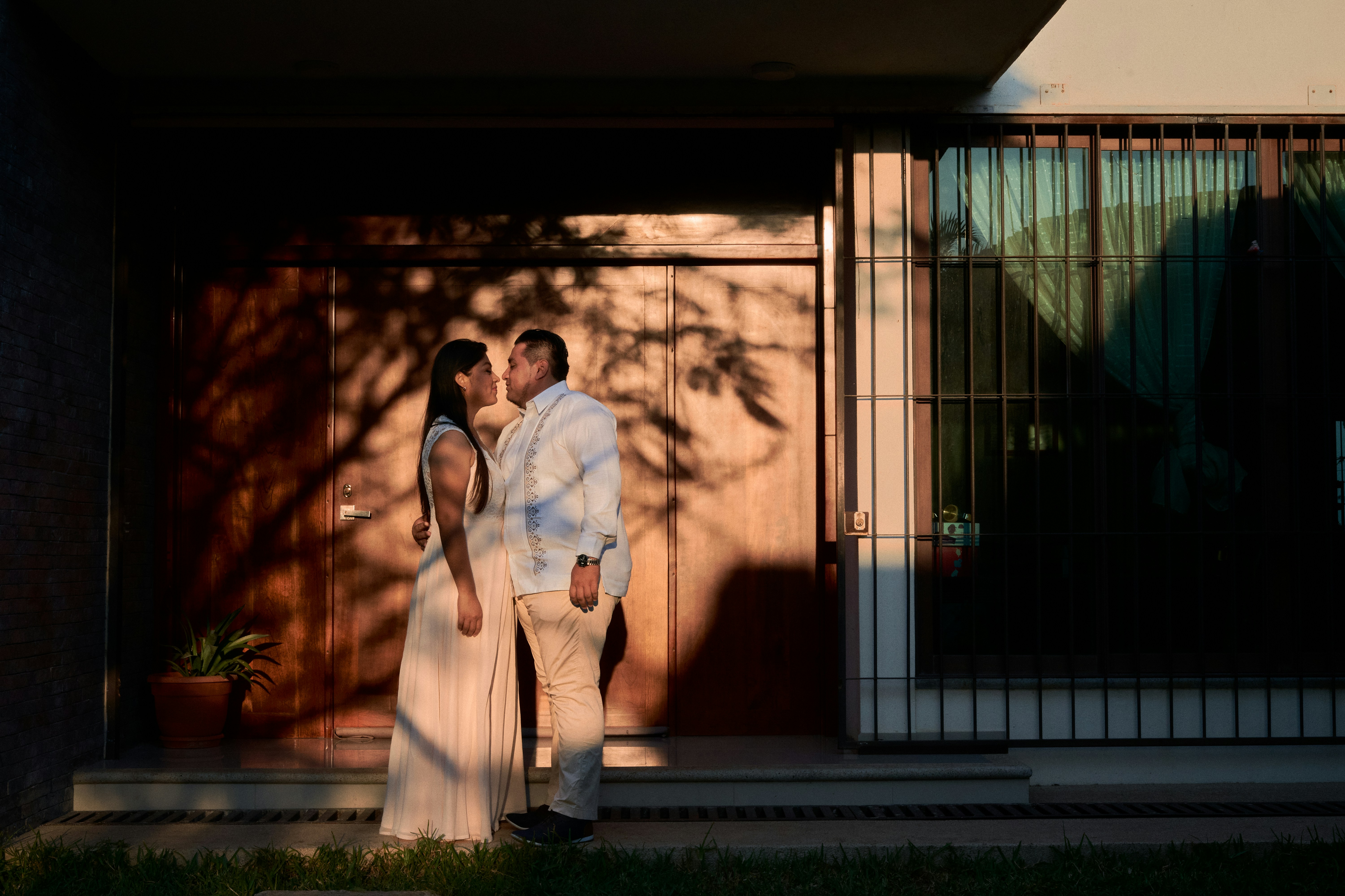 a man and woman kissing