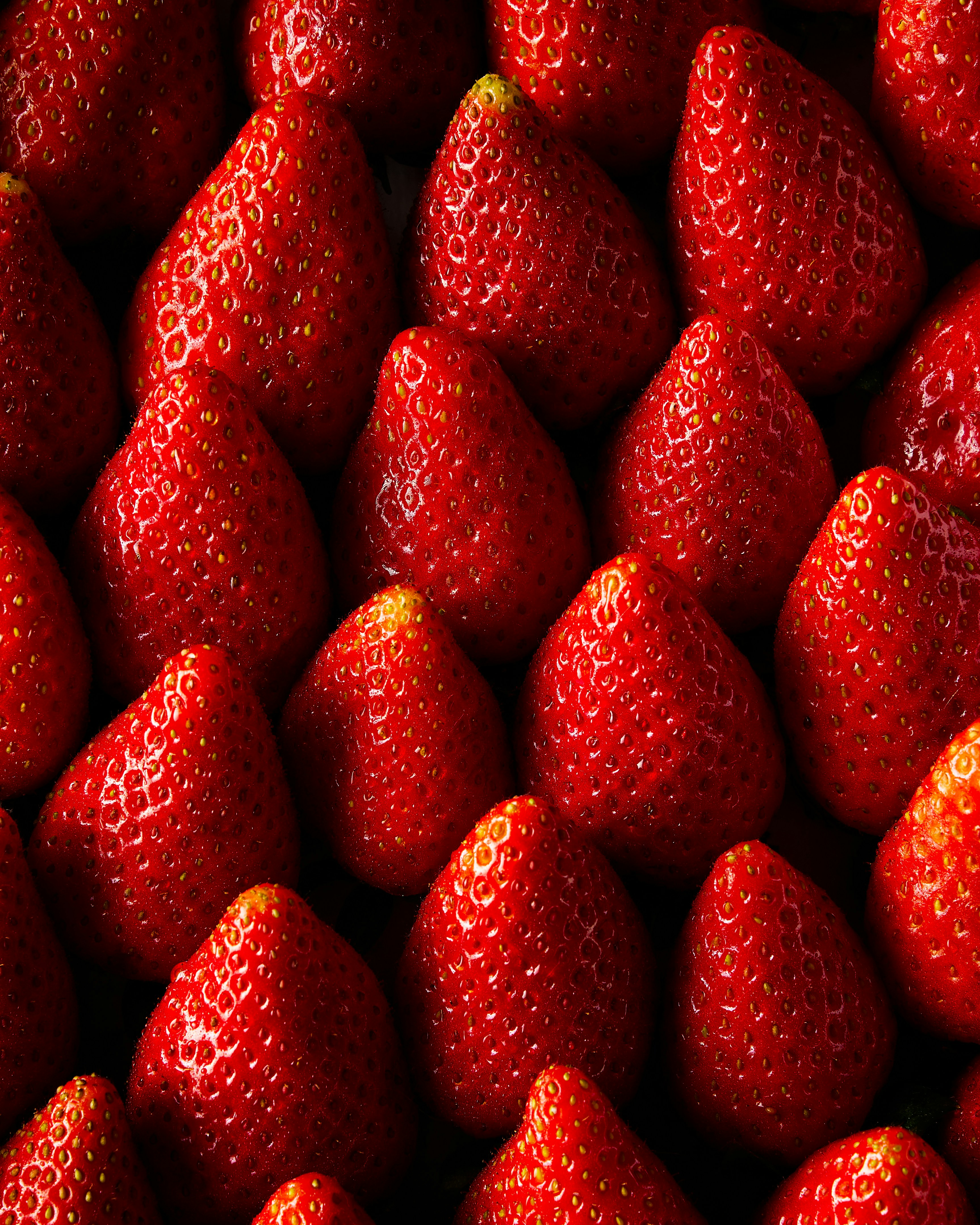 Strawberries | a pile of red potatoes