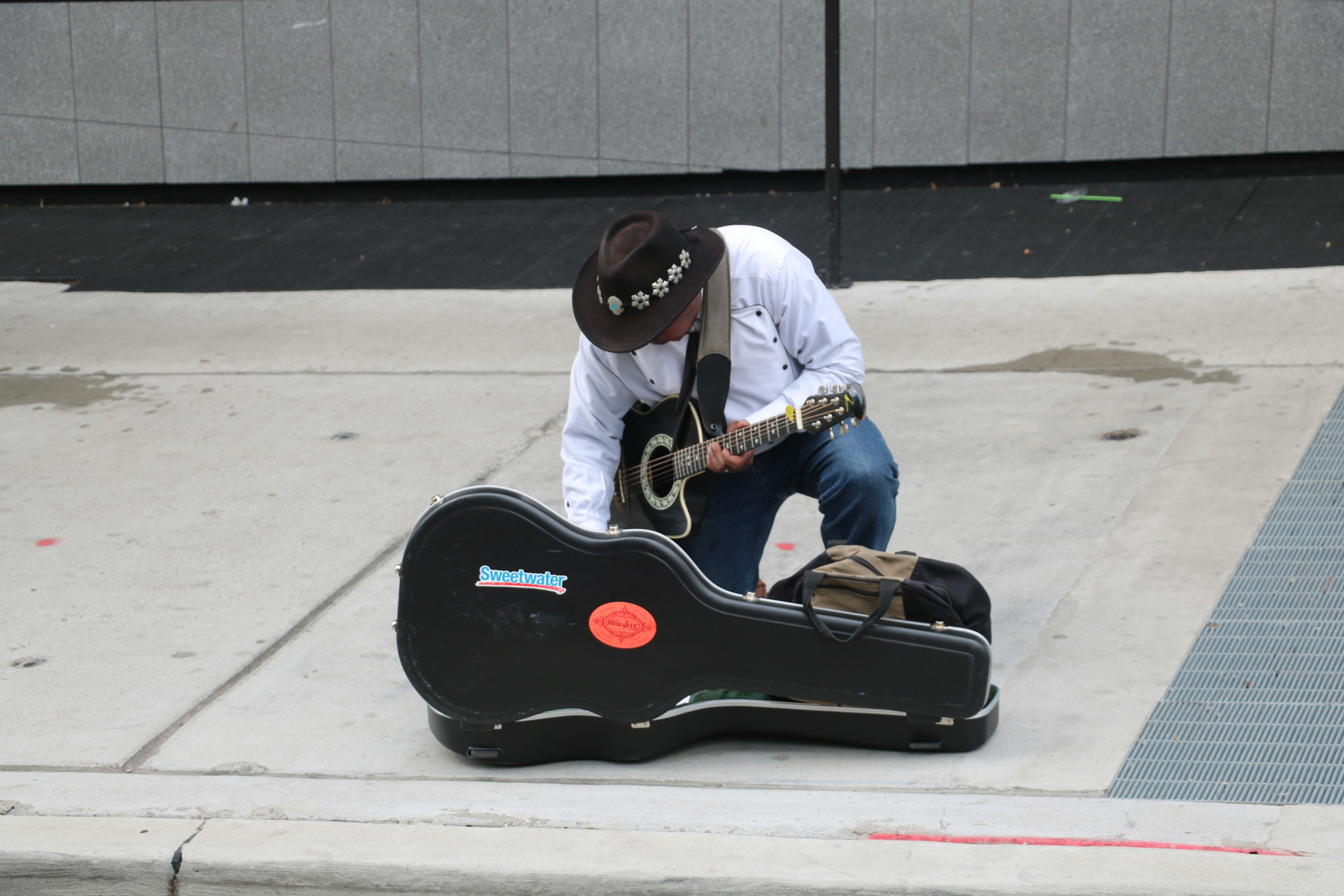 a man playing a guitar