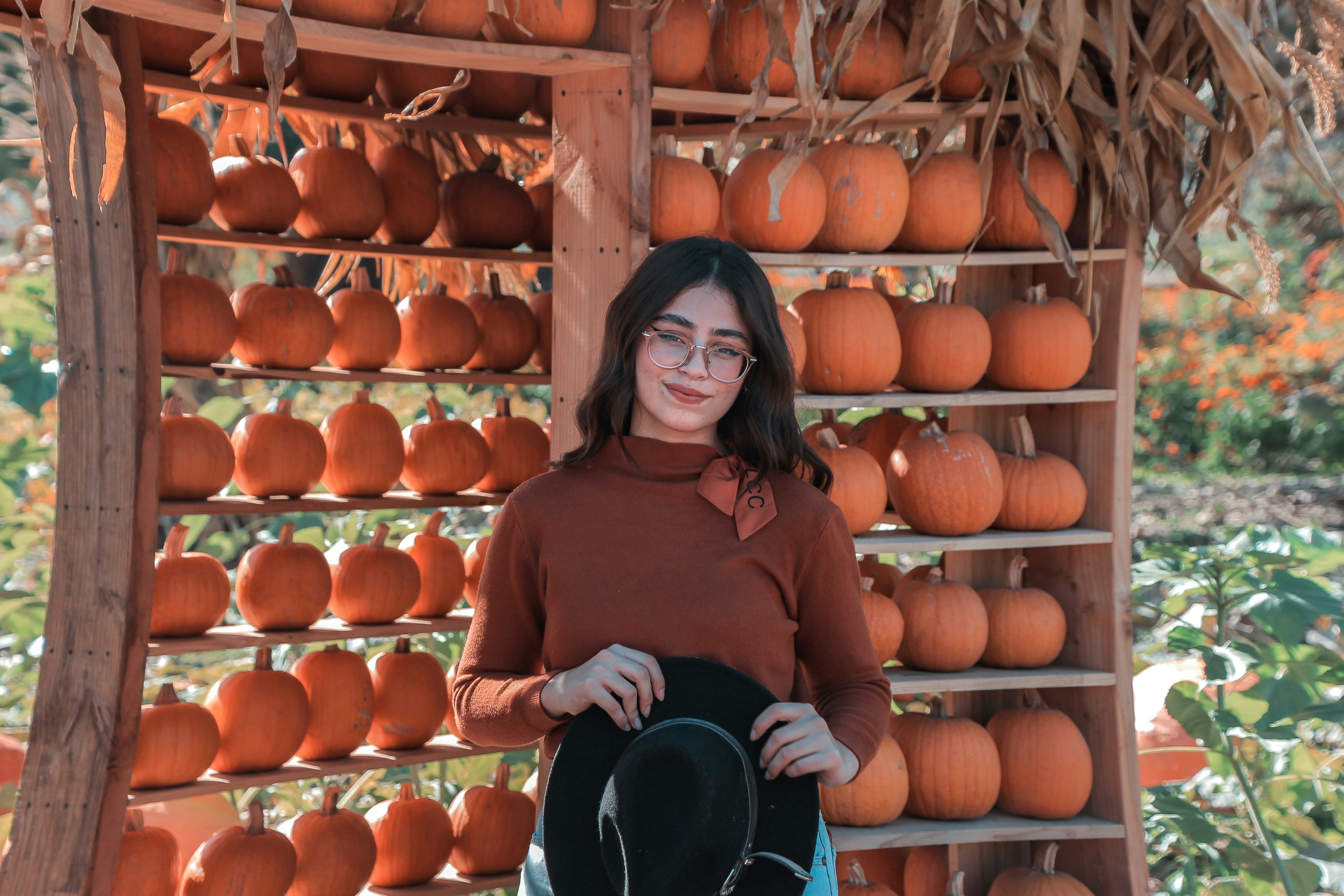 Autumn Portrait Among Pumpkin Rows