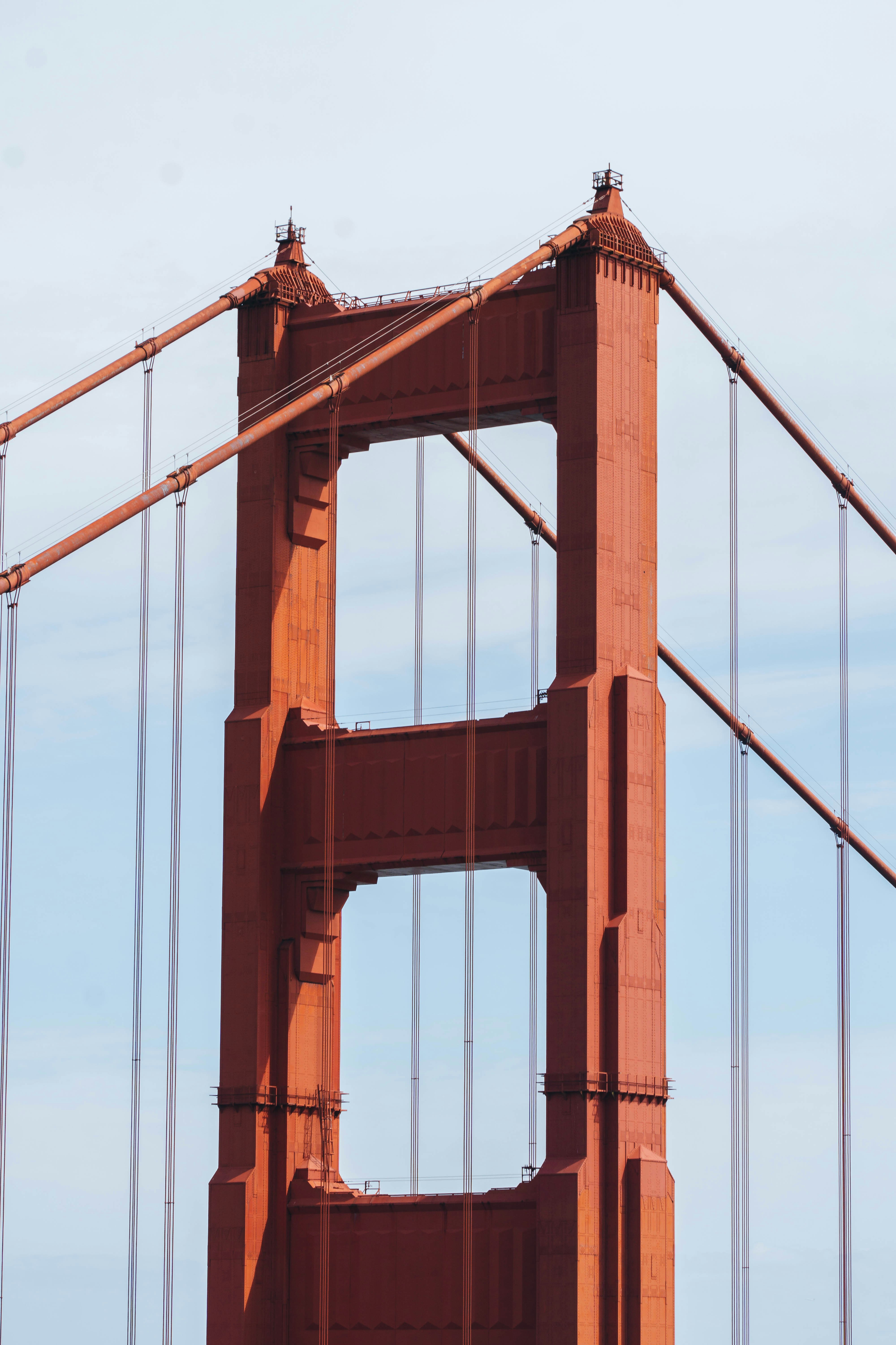 A large red bridge with Golden Gate Bridge in the background photo ...