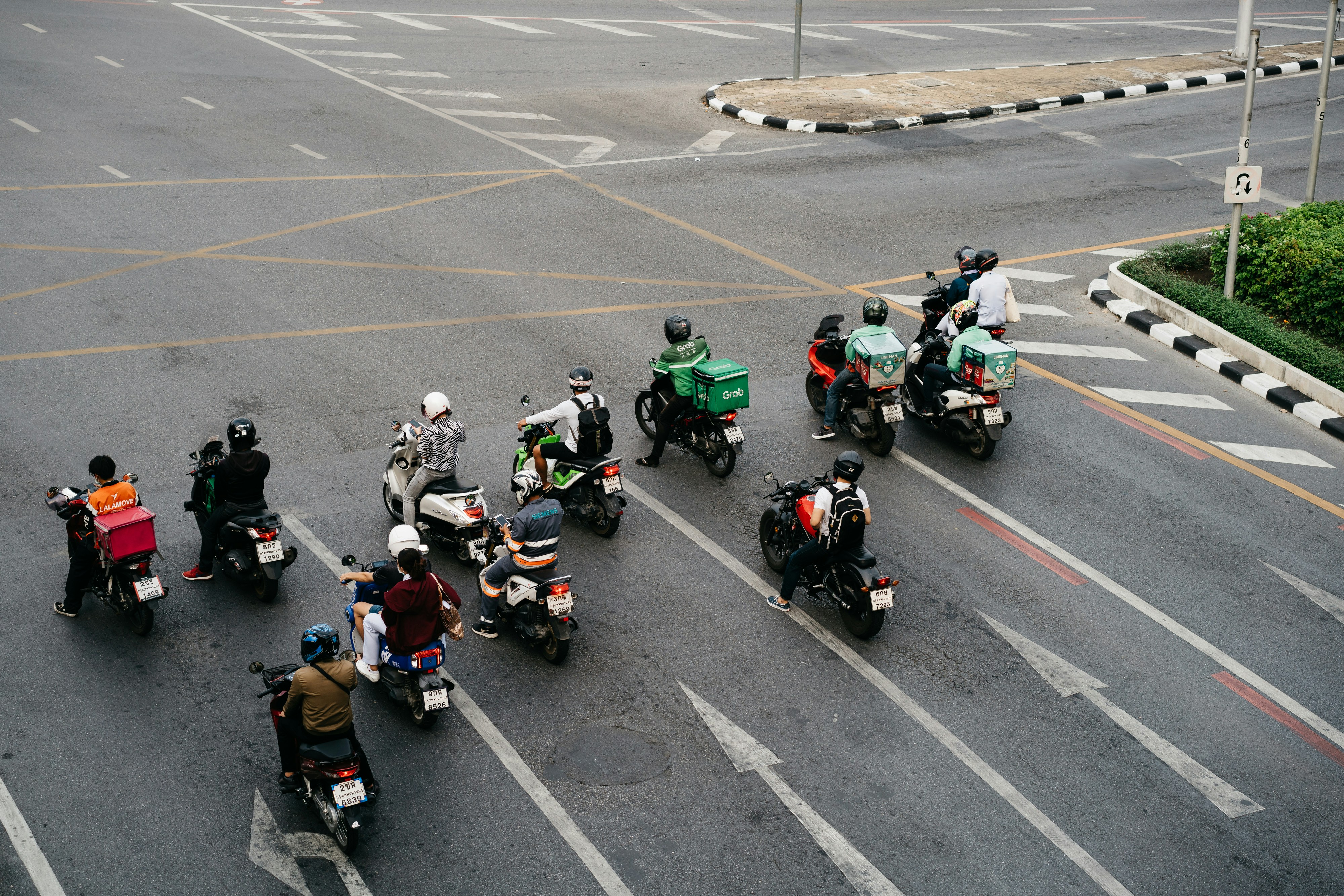 A group of people riding motorcycles photo – Free Bangkok Image on Unsplash