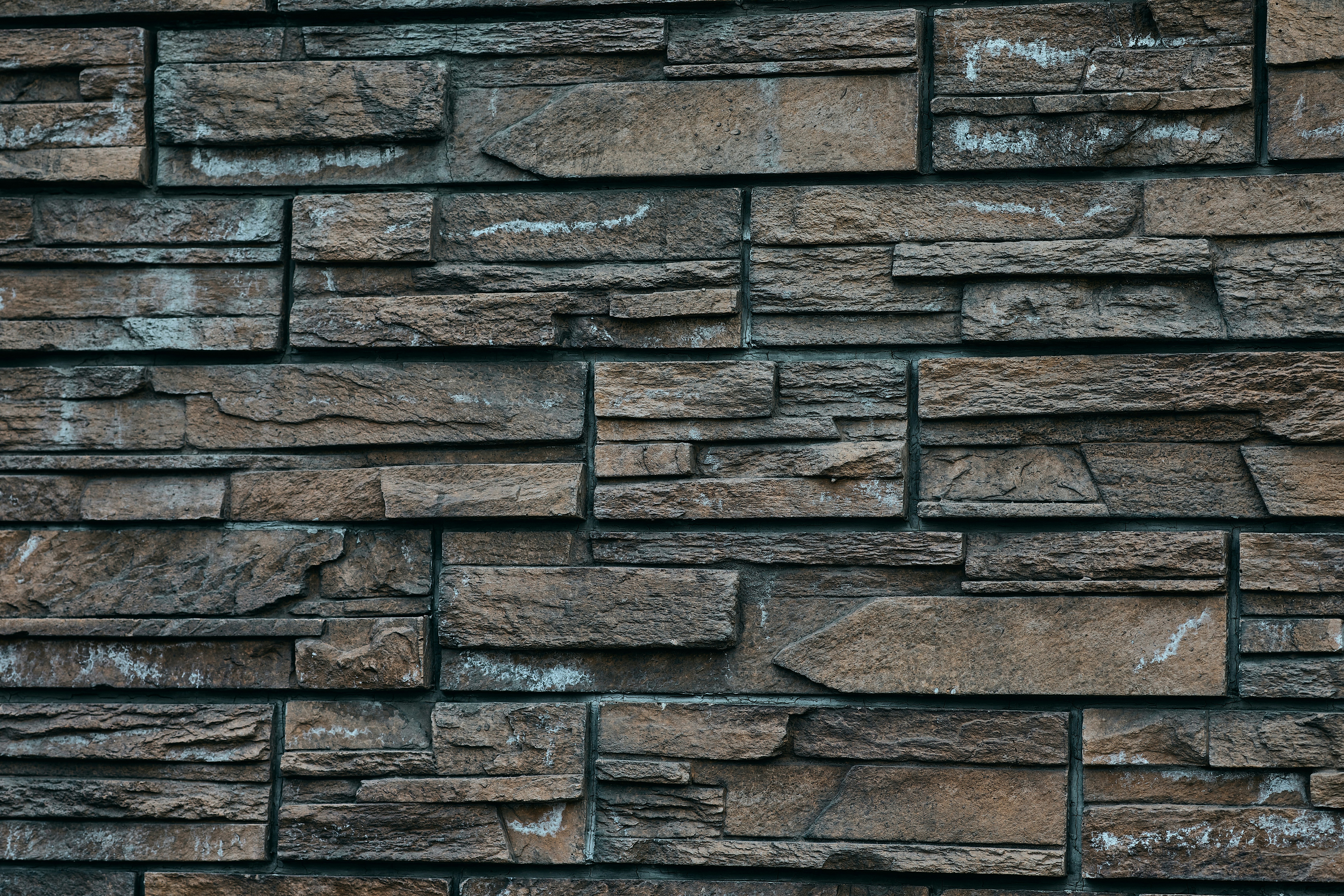 Textured stone wall - horizontal overlay for Photoshop | a close up of a brick wall