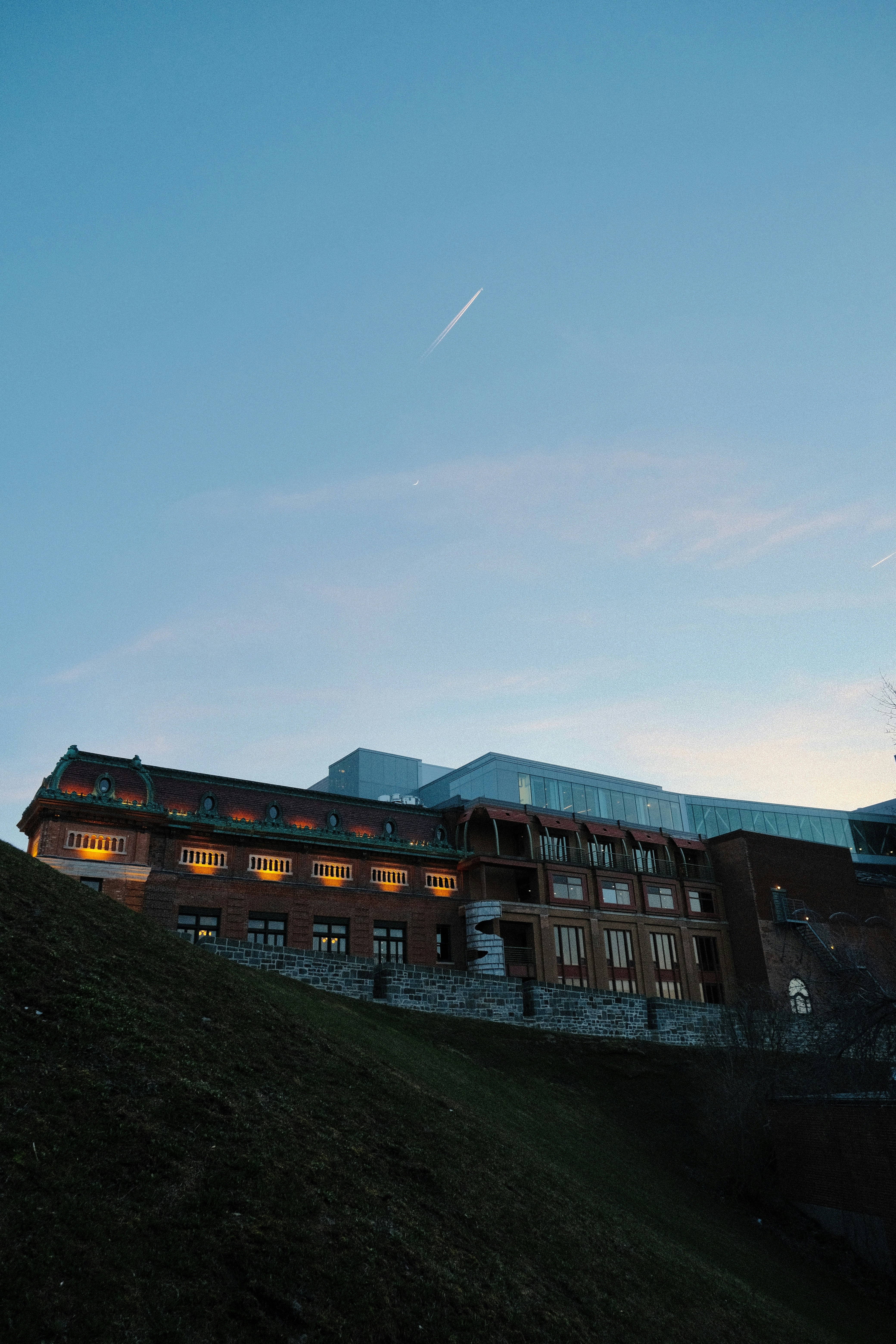 A building with a hill in the front photo – Free Building Image on Unsplash