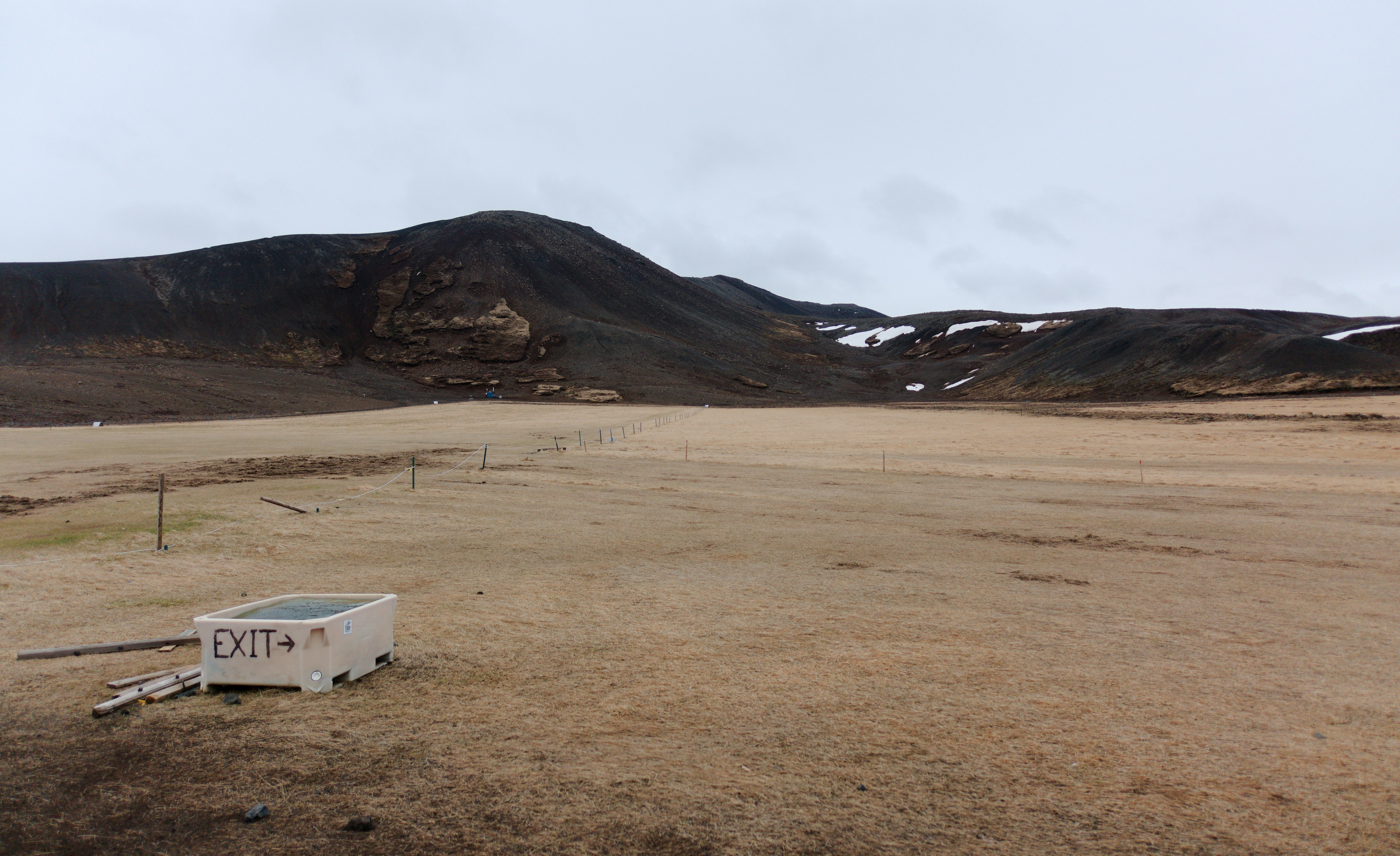a white box in a dry field