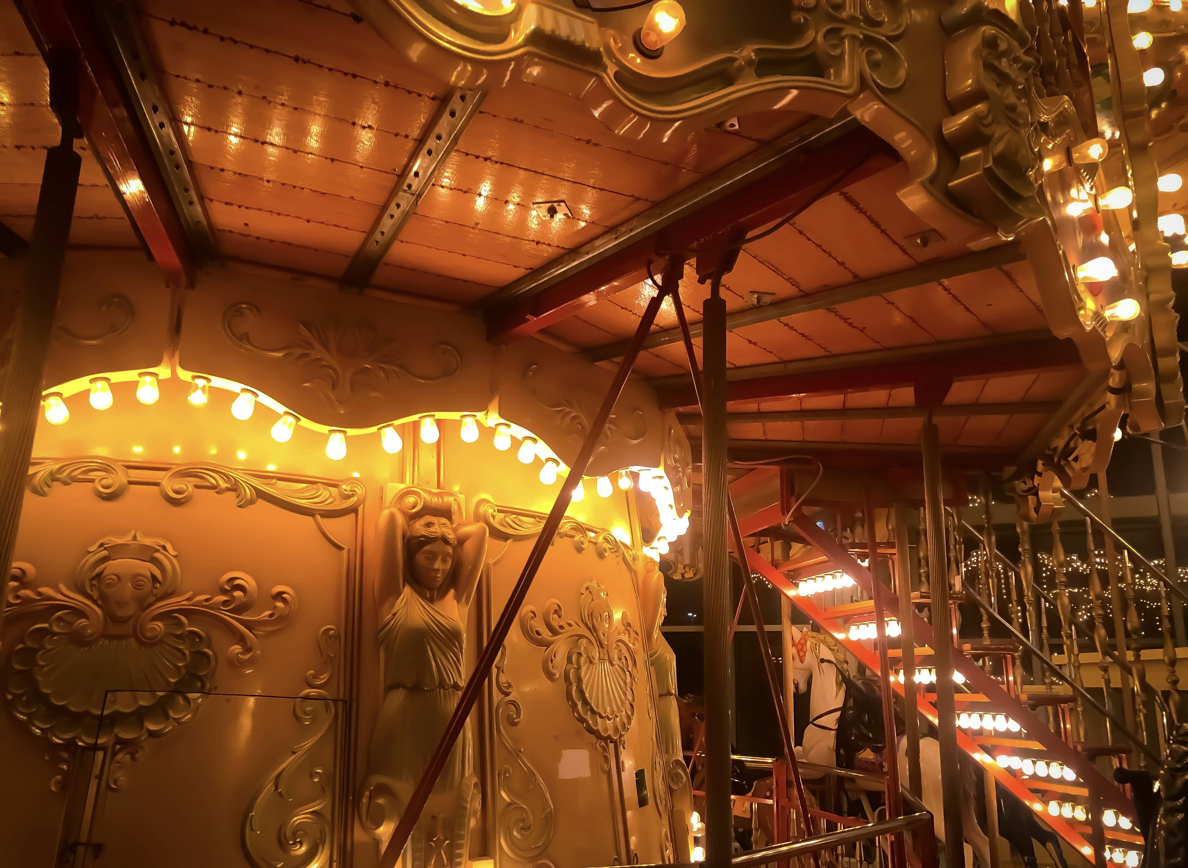 Gold-Glow Carousel: Night Ride Through Ornate Lights
