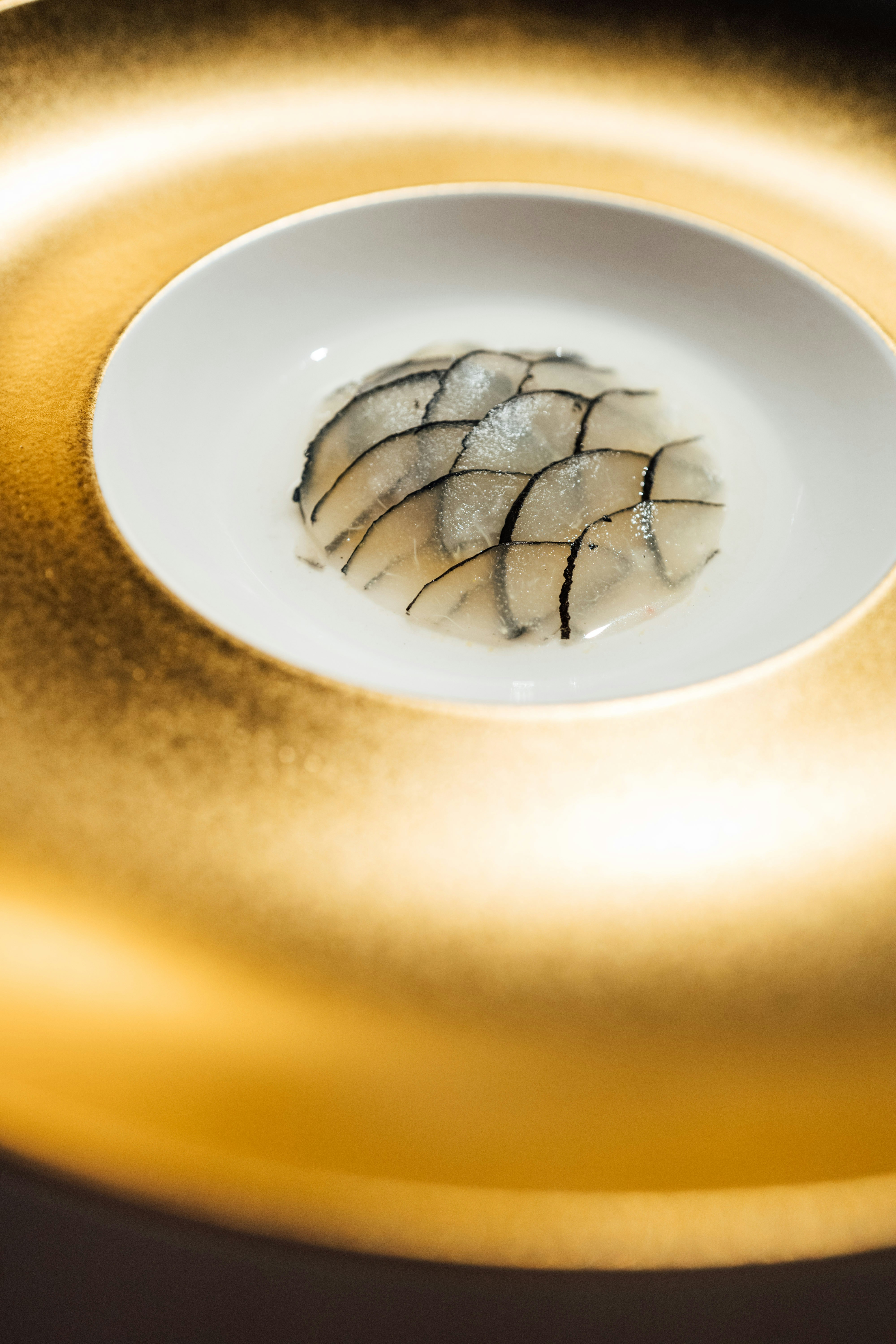 a white bowl with a white substance in itCHUTTERSNAP