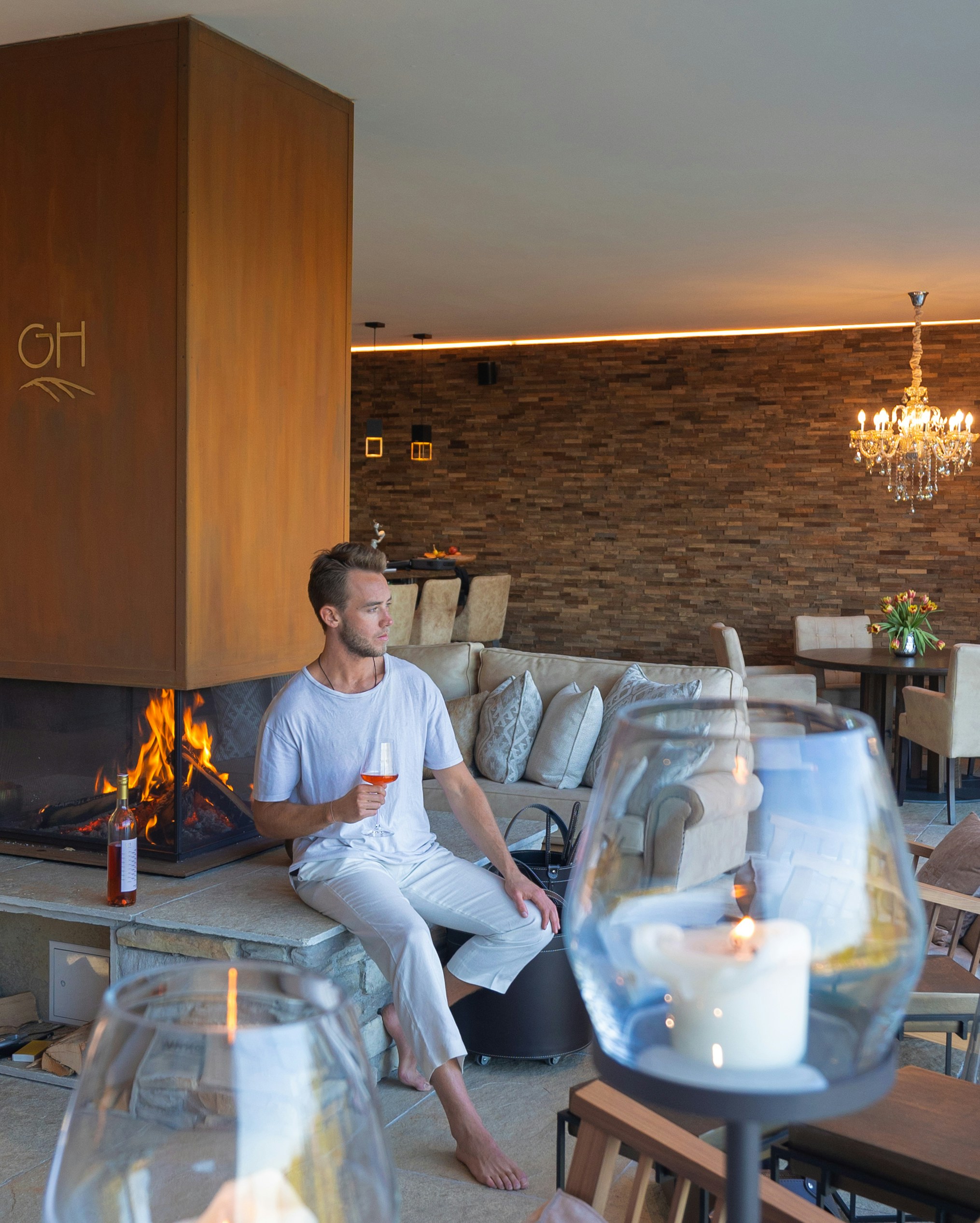 Gentleman by the Flame: Quiet Contemplation in a Luxe Lounge