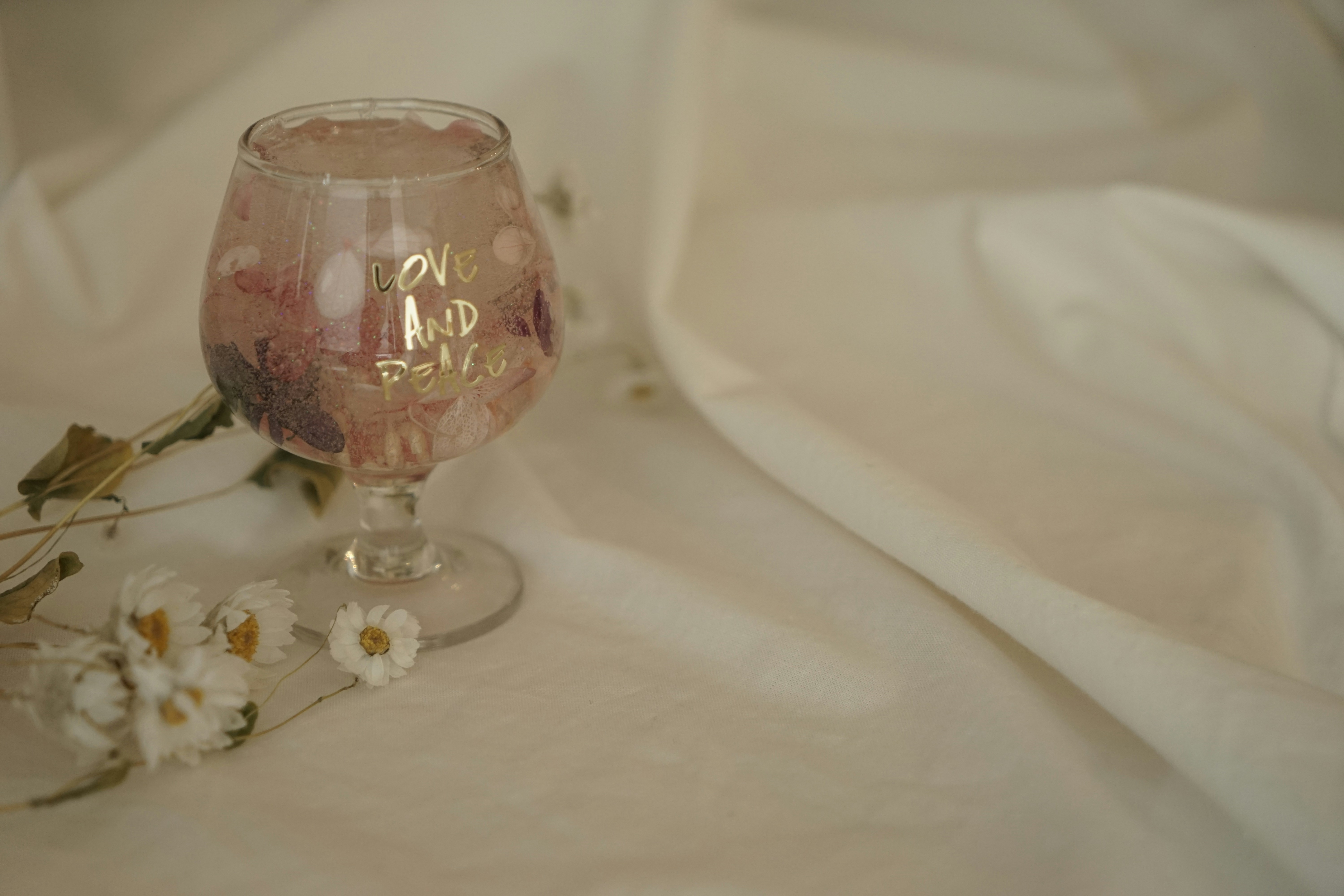 a glass of wine on a table