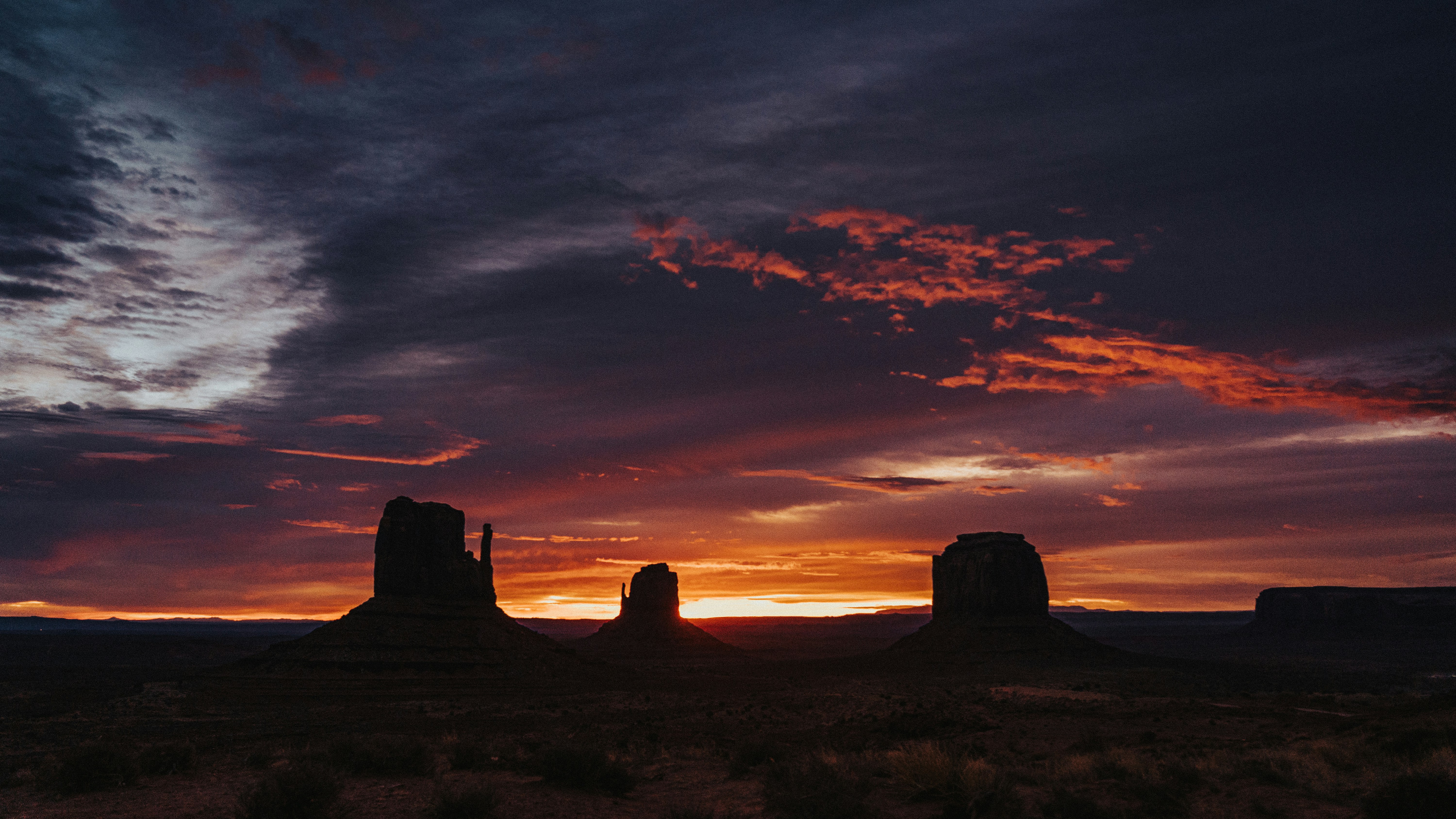 Dusk Over the Three Desert Monoliths