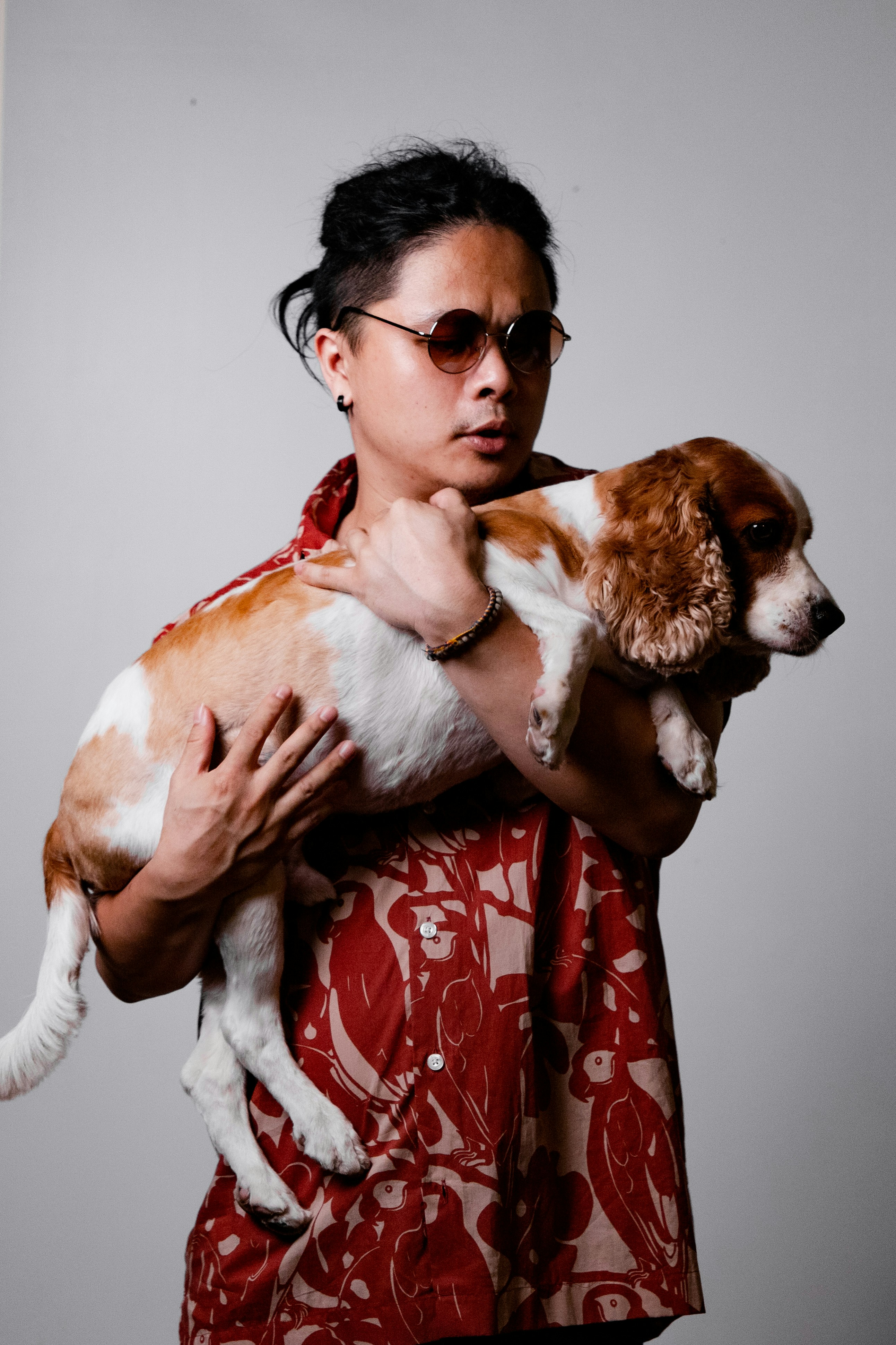 Holding On: A Portrait of Companionship in Red Plaid