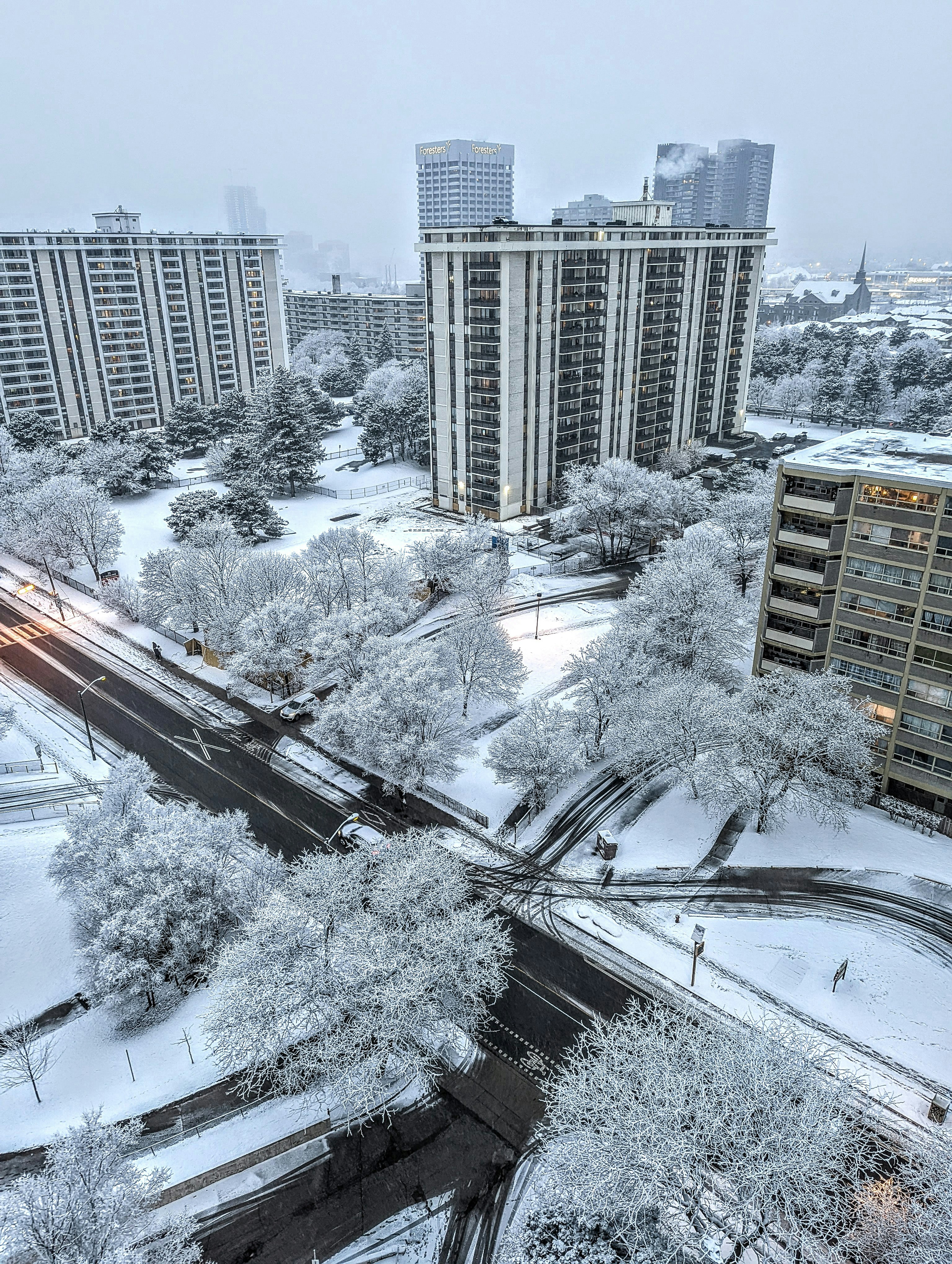 A view of a snowy city from a tall building photo – Free Toronto Image ...