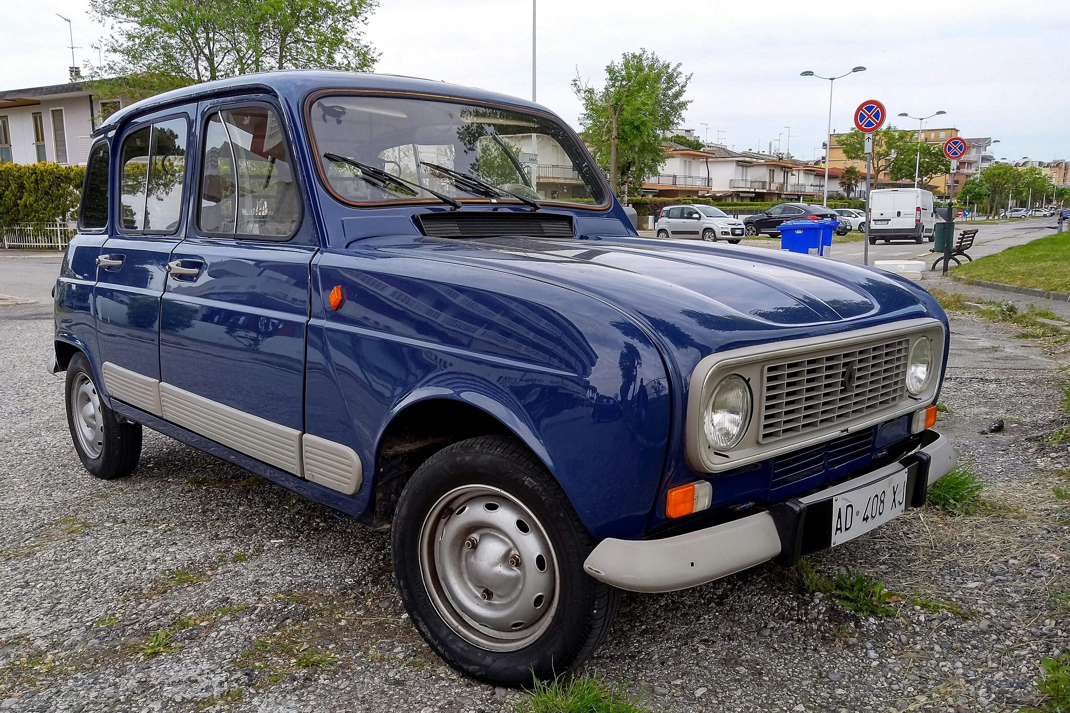 A small blue truck parked on a gravel road photo – Free Car Image on ...