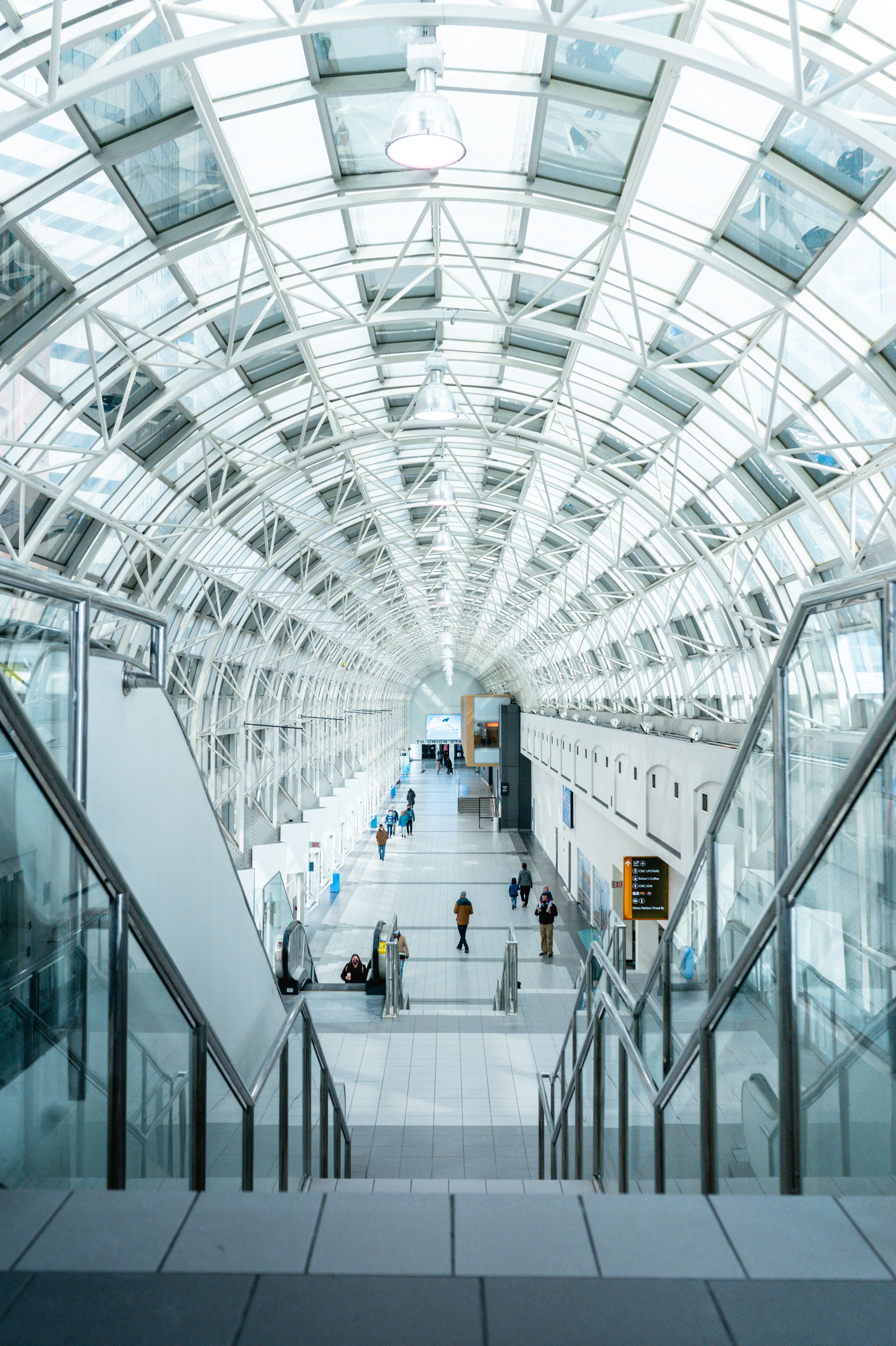 A walkway inside of a building with a skylight photo – Free Toronto ...