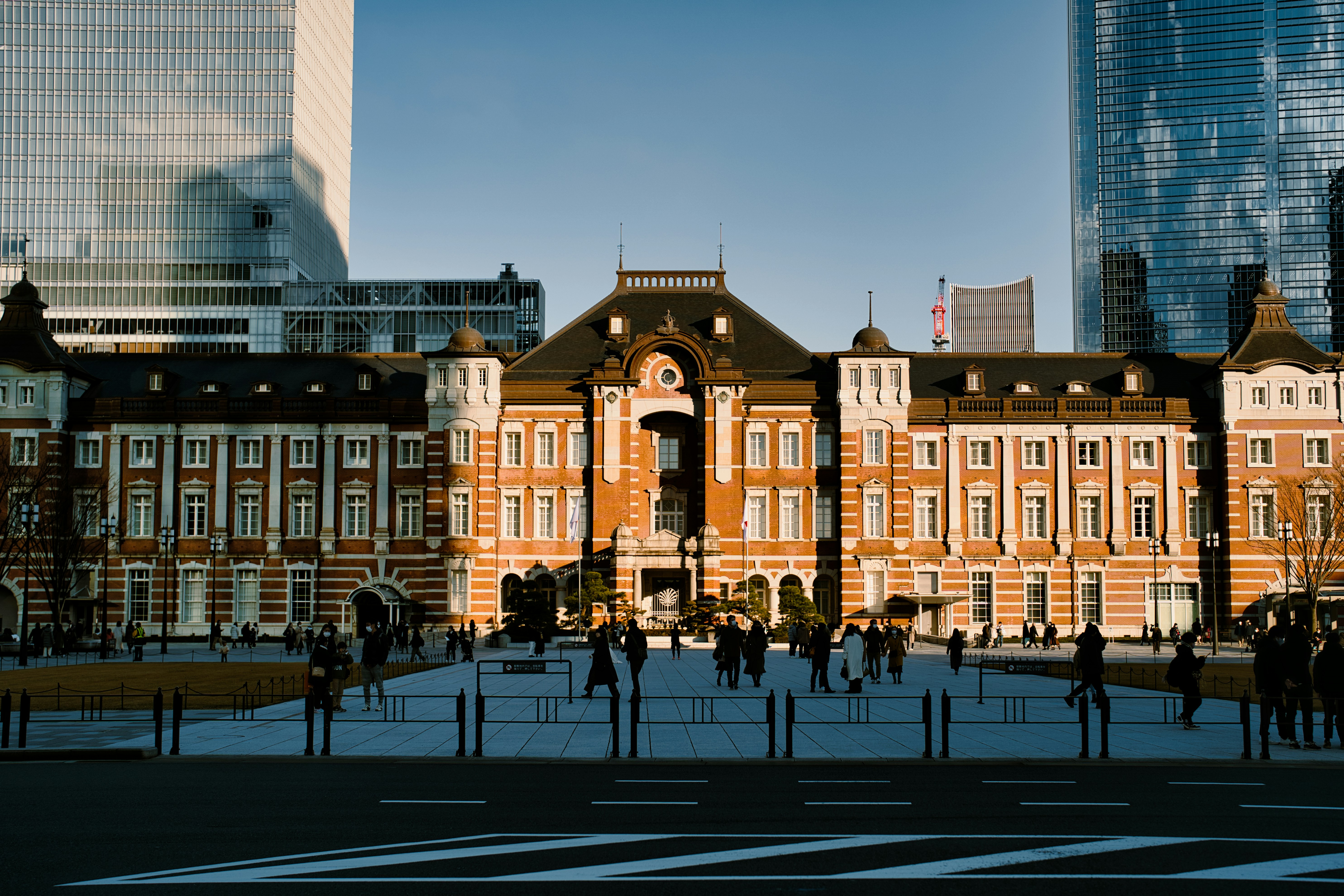 a group of people standing in front of a building
