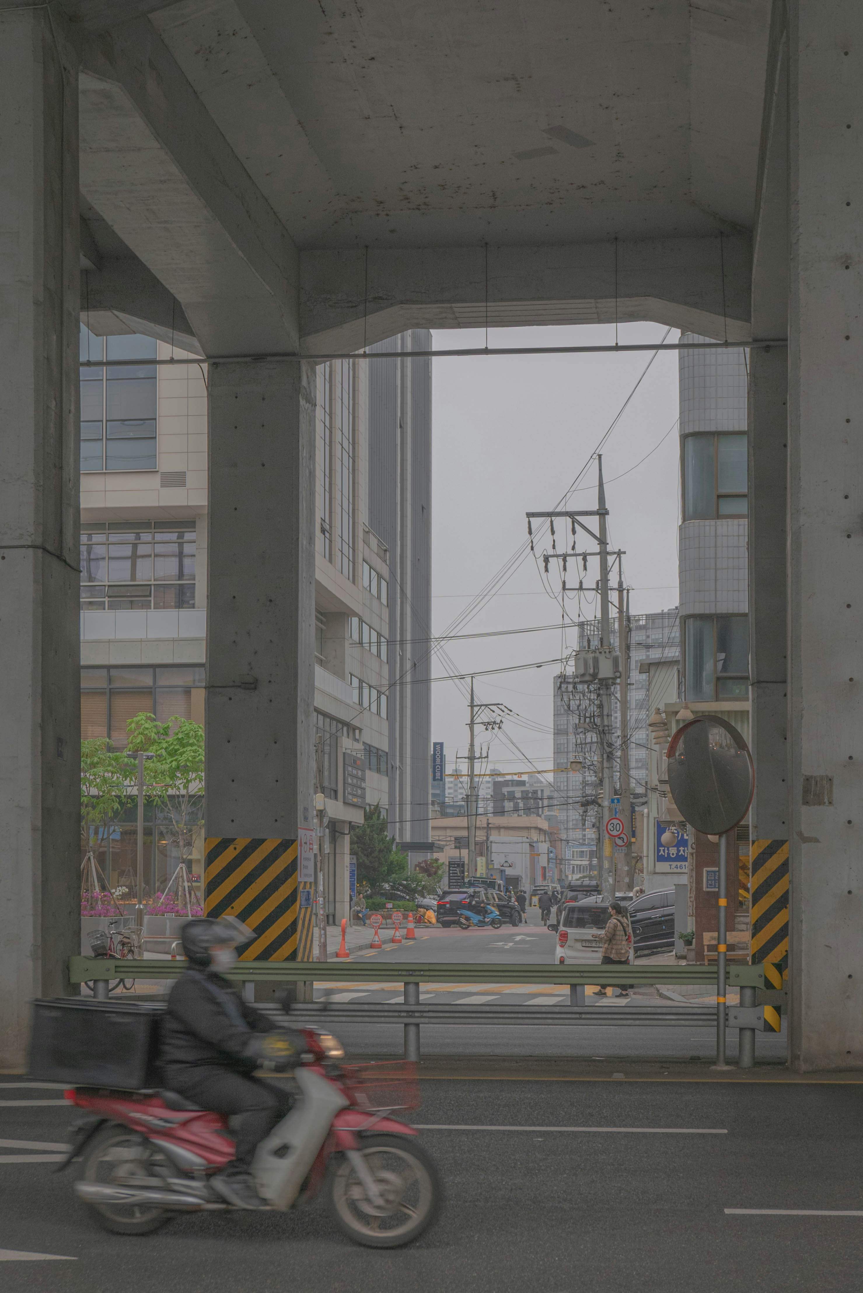 a person riding a motorcycle on a city street
