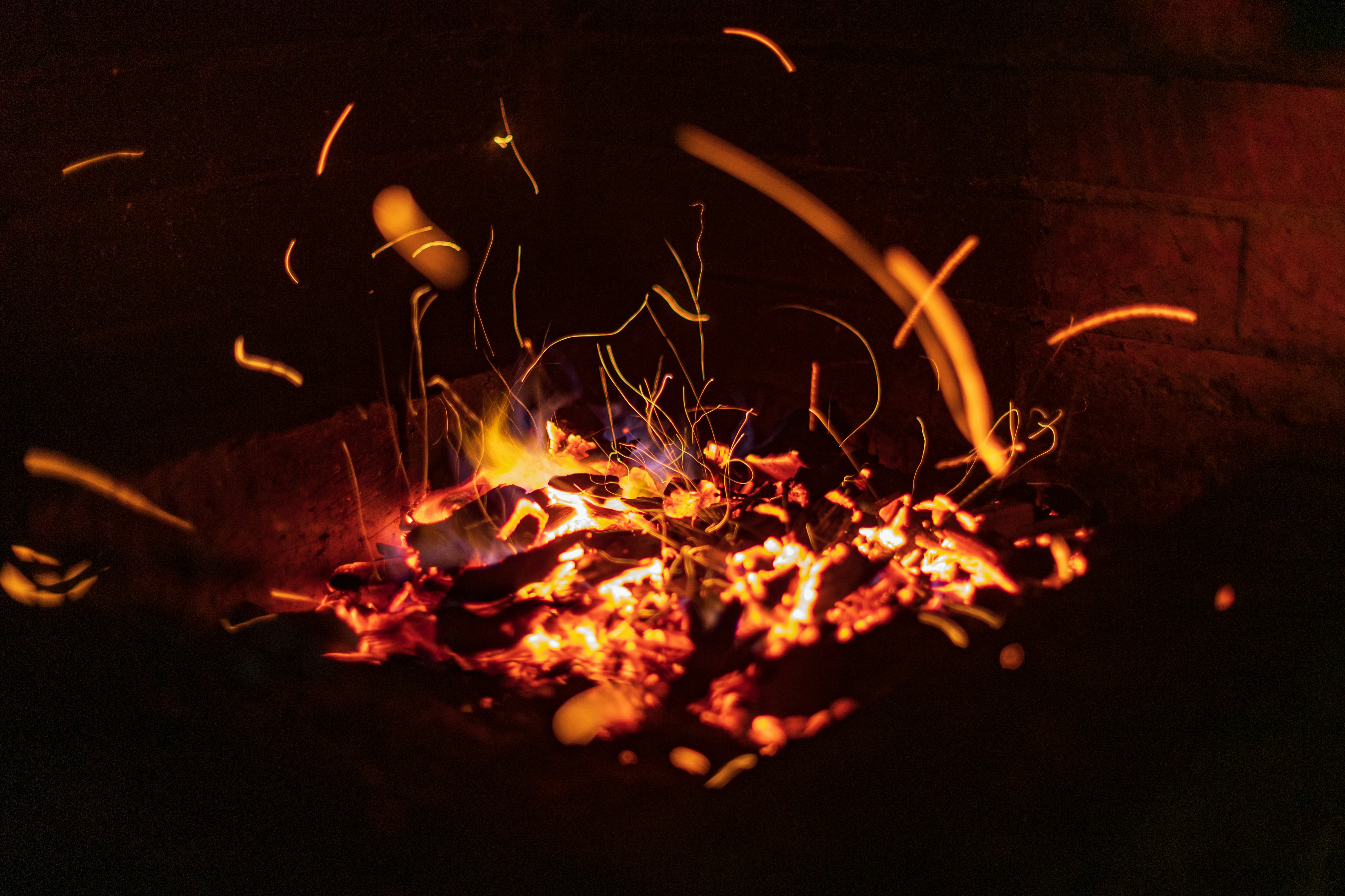 A fire is lit up in the dark photo – Free Fire Image on Unsplash