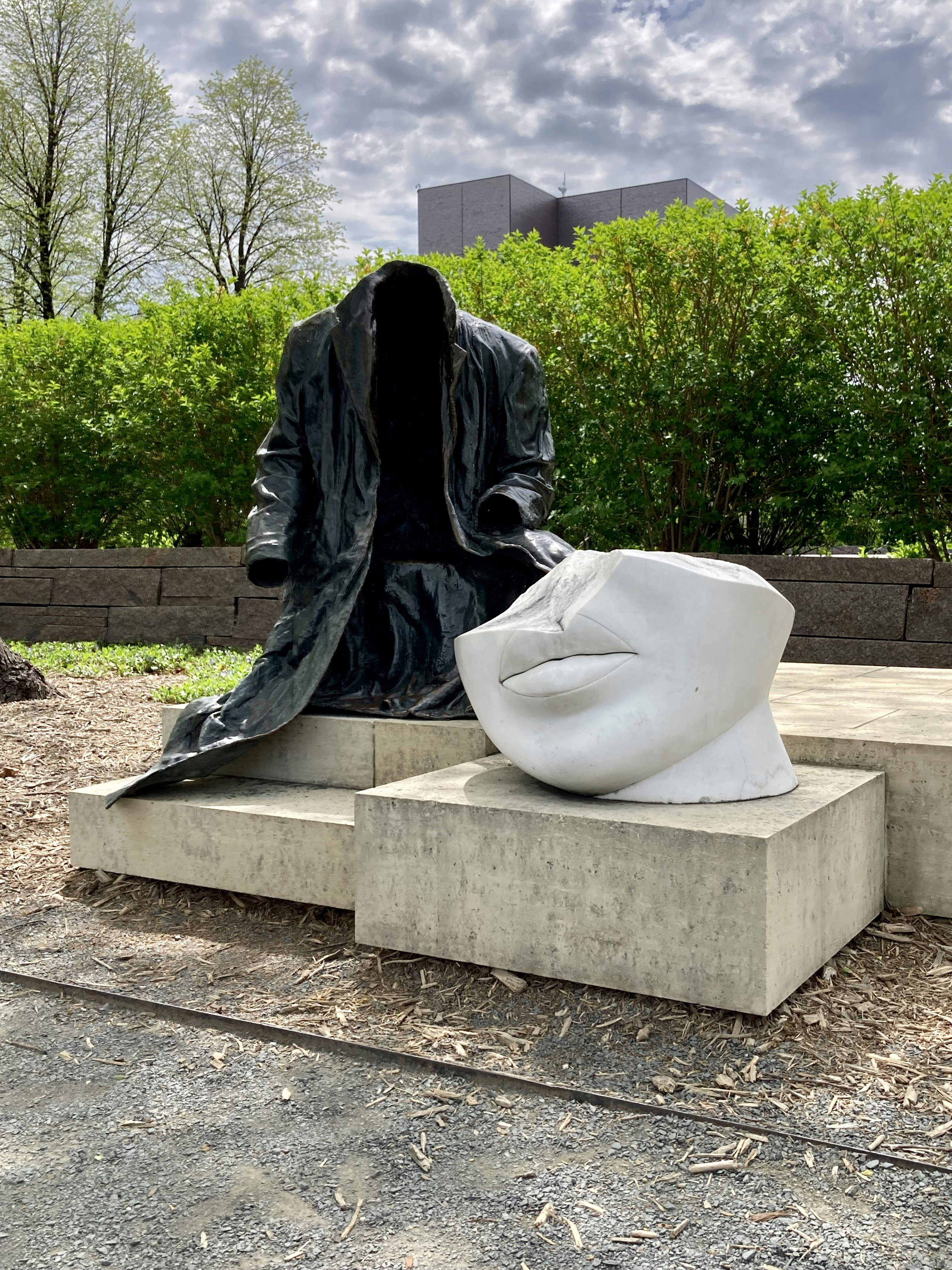 Disconnected Heads: A Hero’s Cloak and a Floating Smile