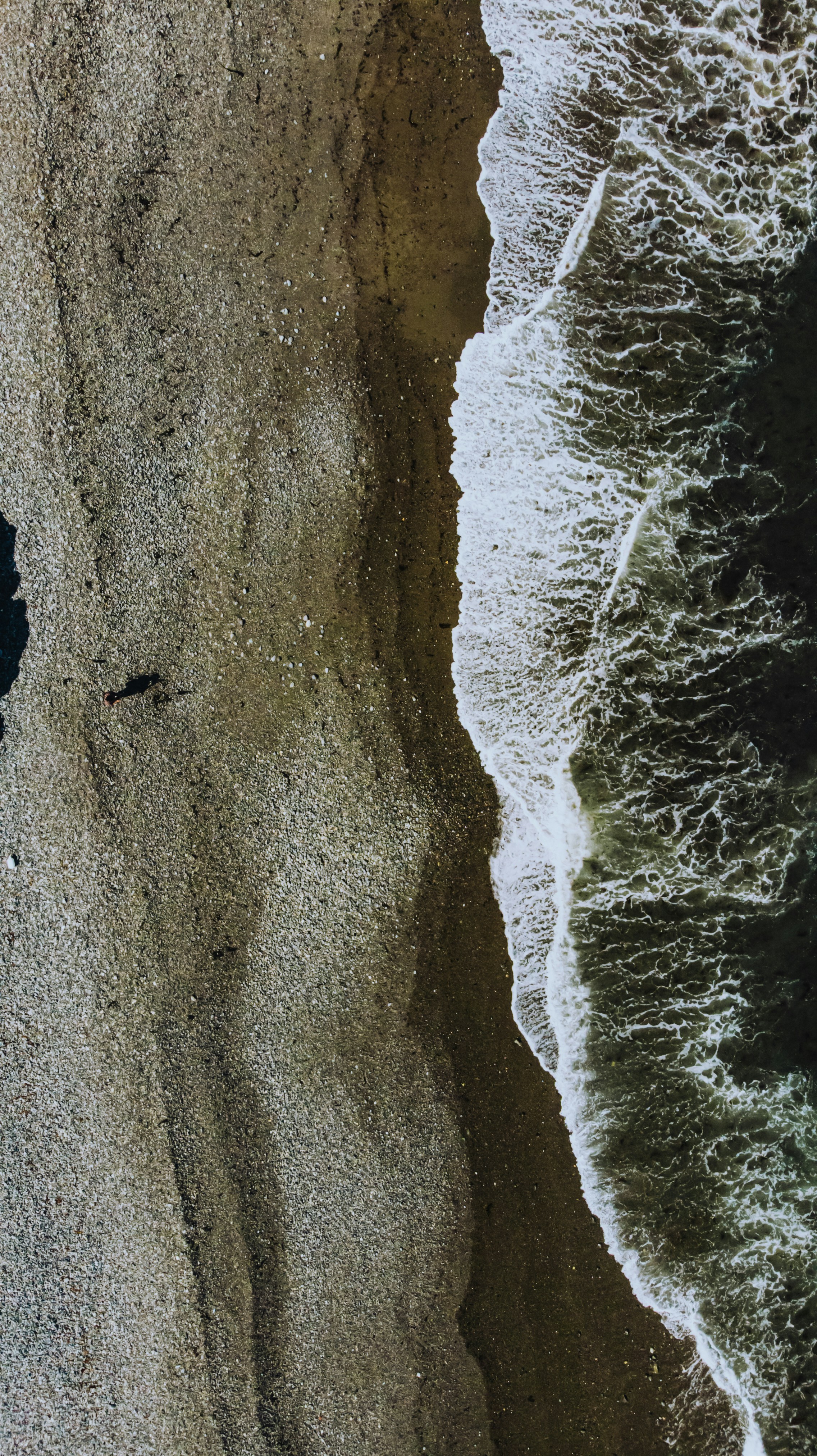 Pebble Edge: Aerial Portrait of Foam and Stone