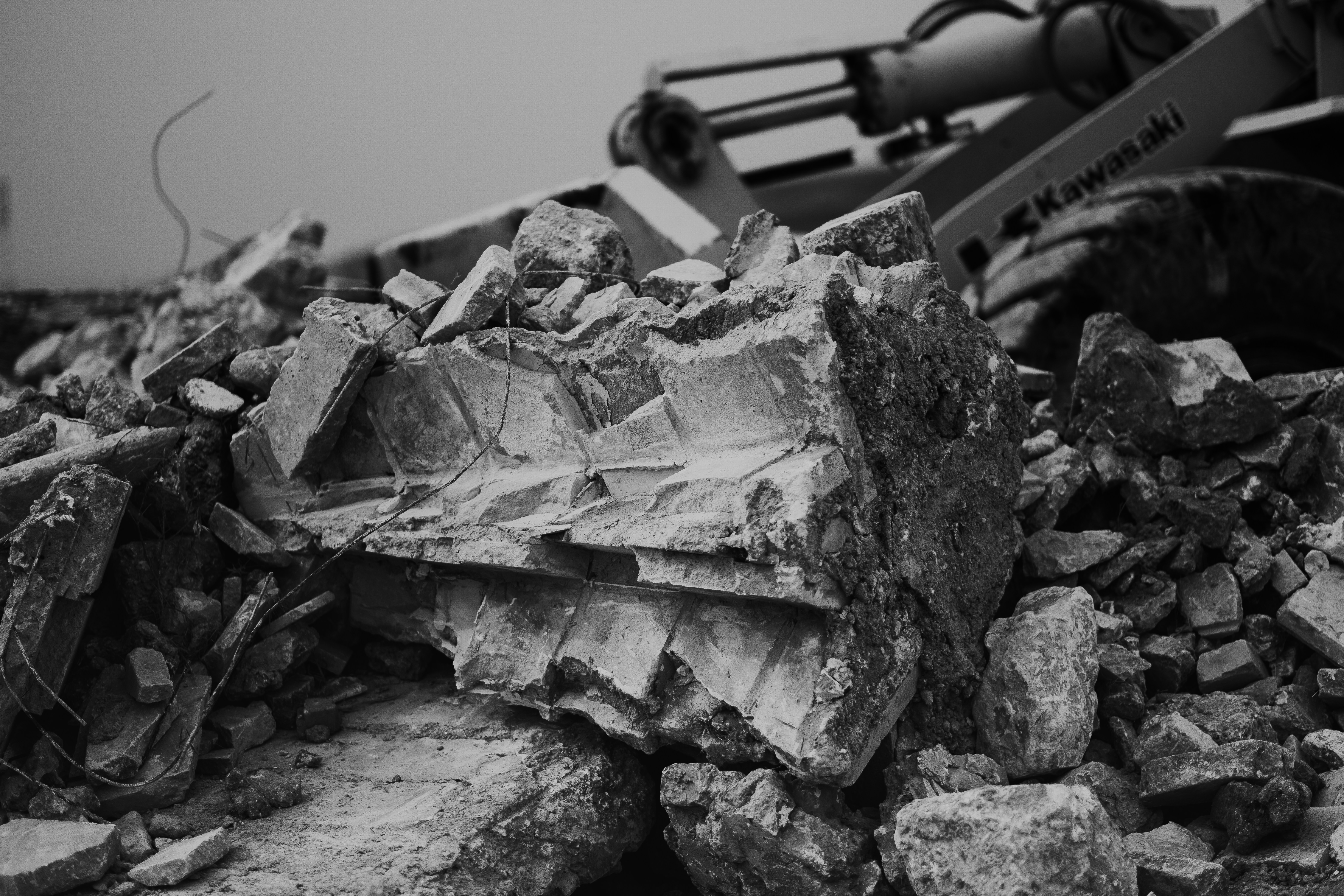 A black and white photo of a pile of rubble photo – Free Shingal Image ...