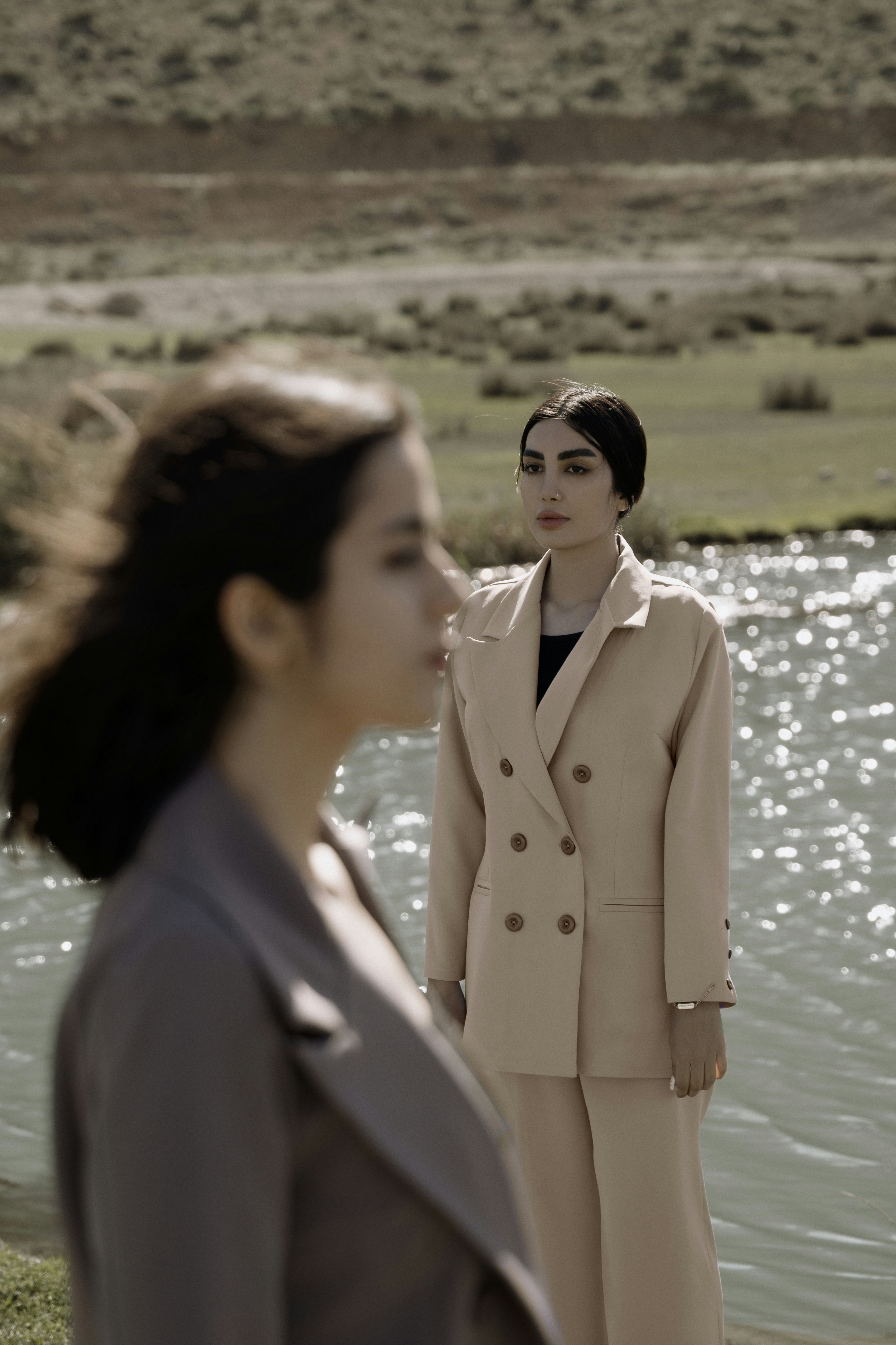 Beige Silhouette by the River: A Quiet Portrait in Soft Focus