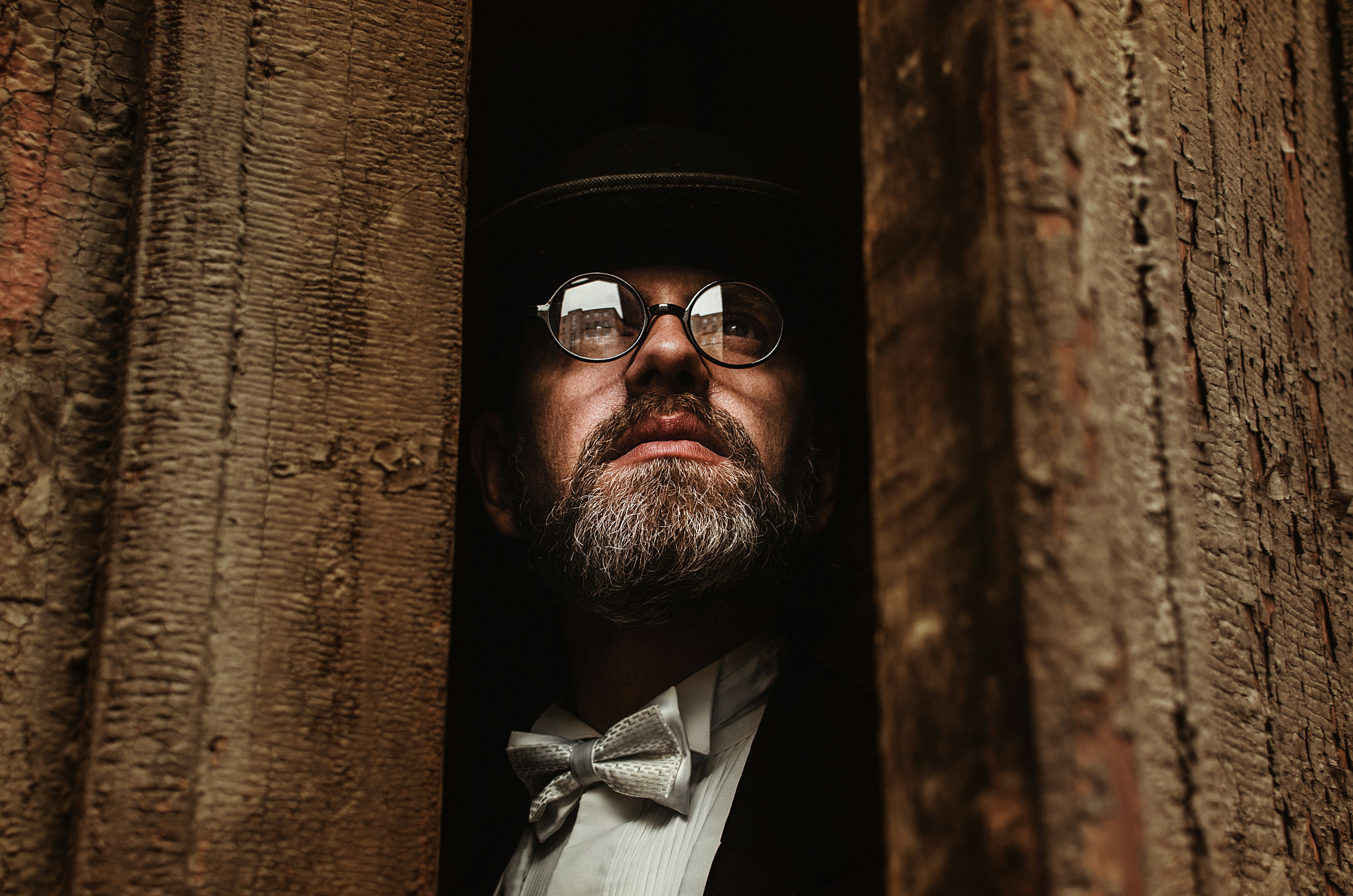 Timber Threshold Portrait: The Gentleman in Shadowed Light