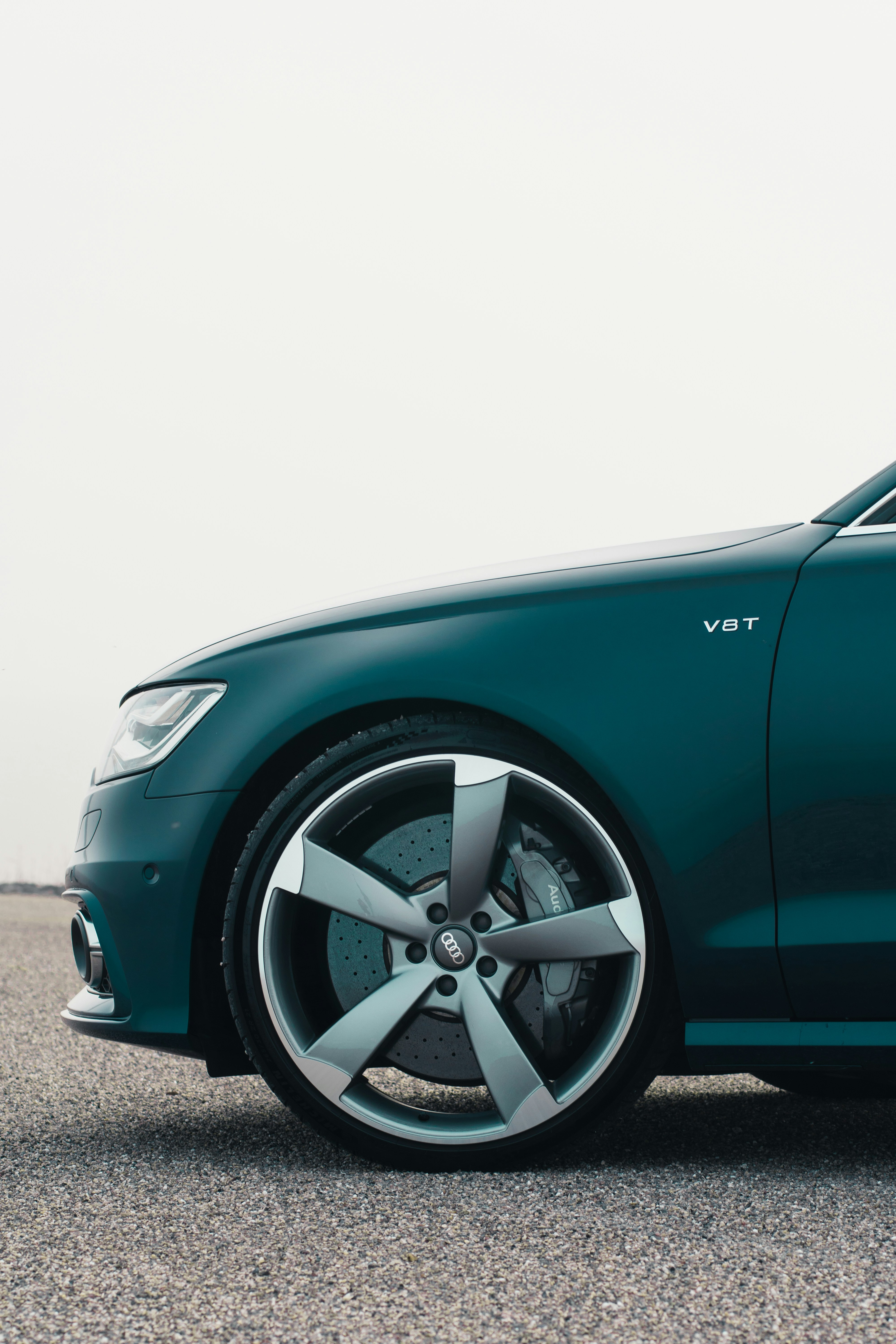 Teal Velocity: close-up of a V8T sports coupe's wheel and sculpted body