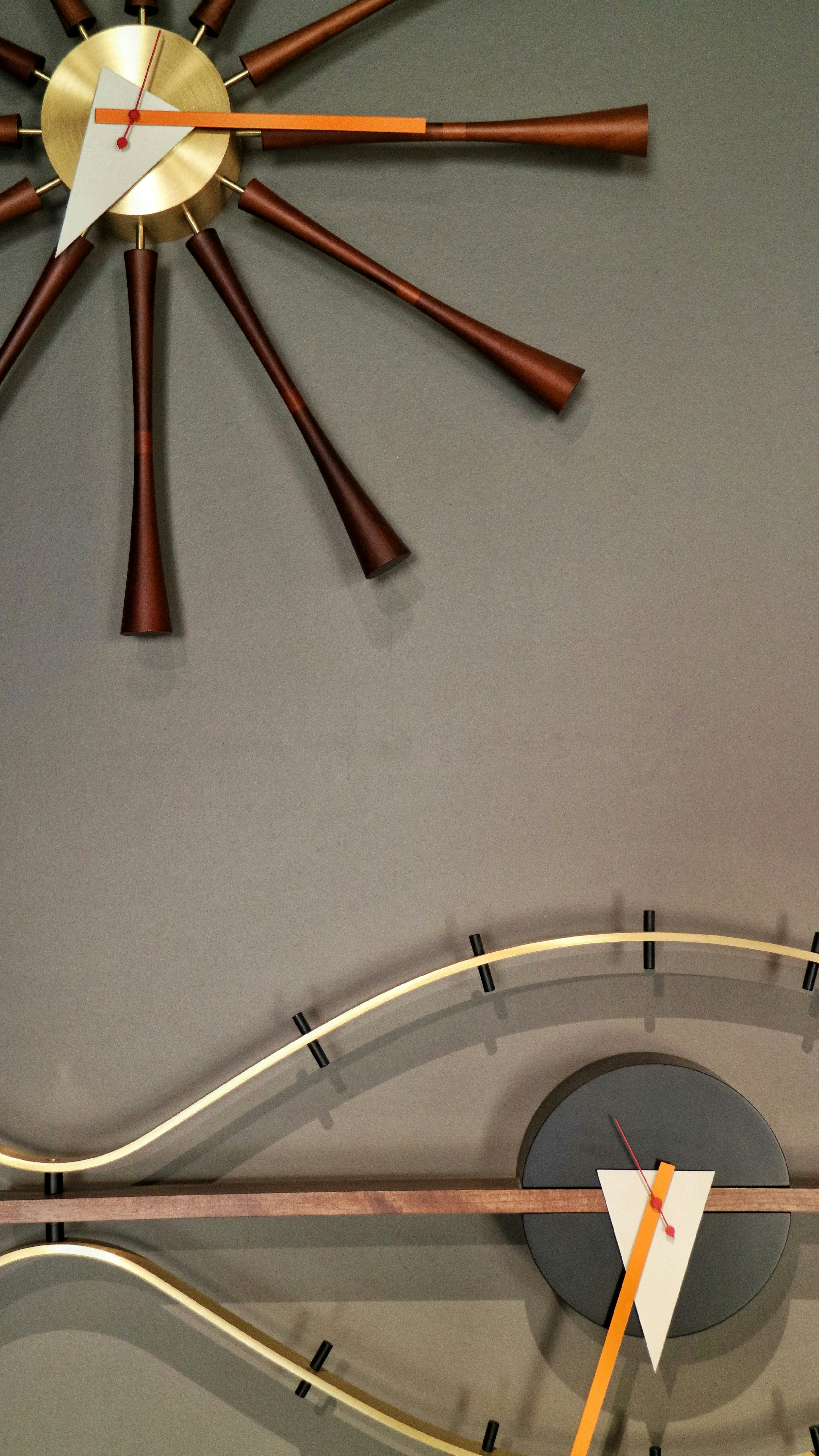 Mid-Century Sunburst Clock Meets a Neon-Wave Wall Clock