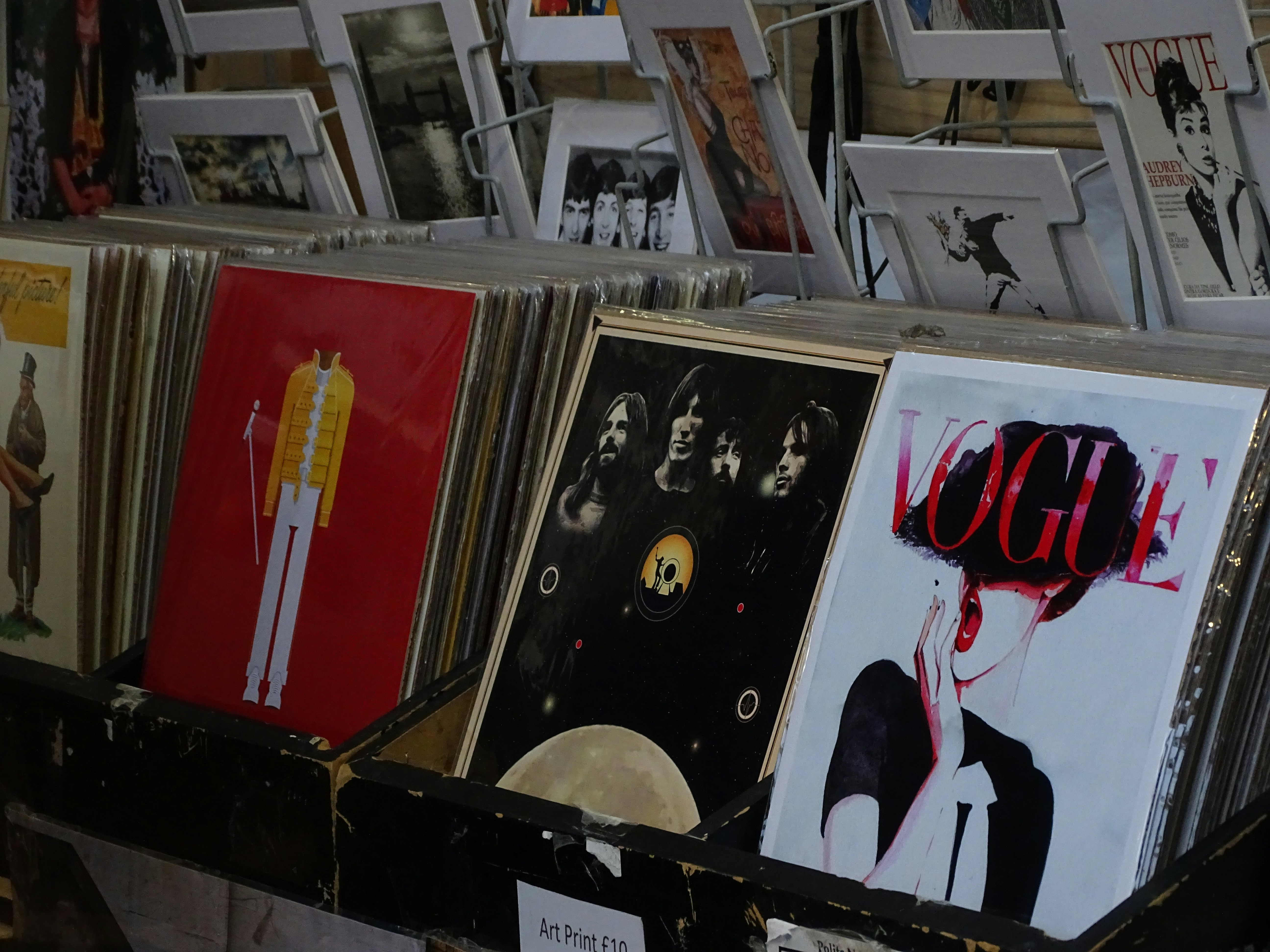 A bunch of posters that are on a table photo – Free Arcade game machine ...