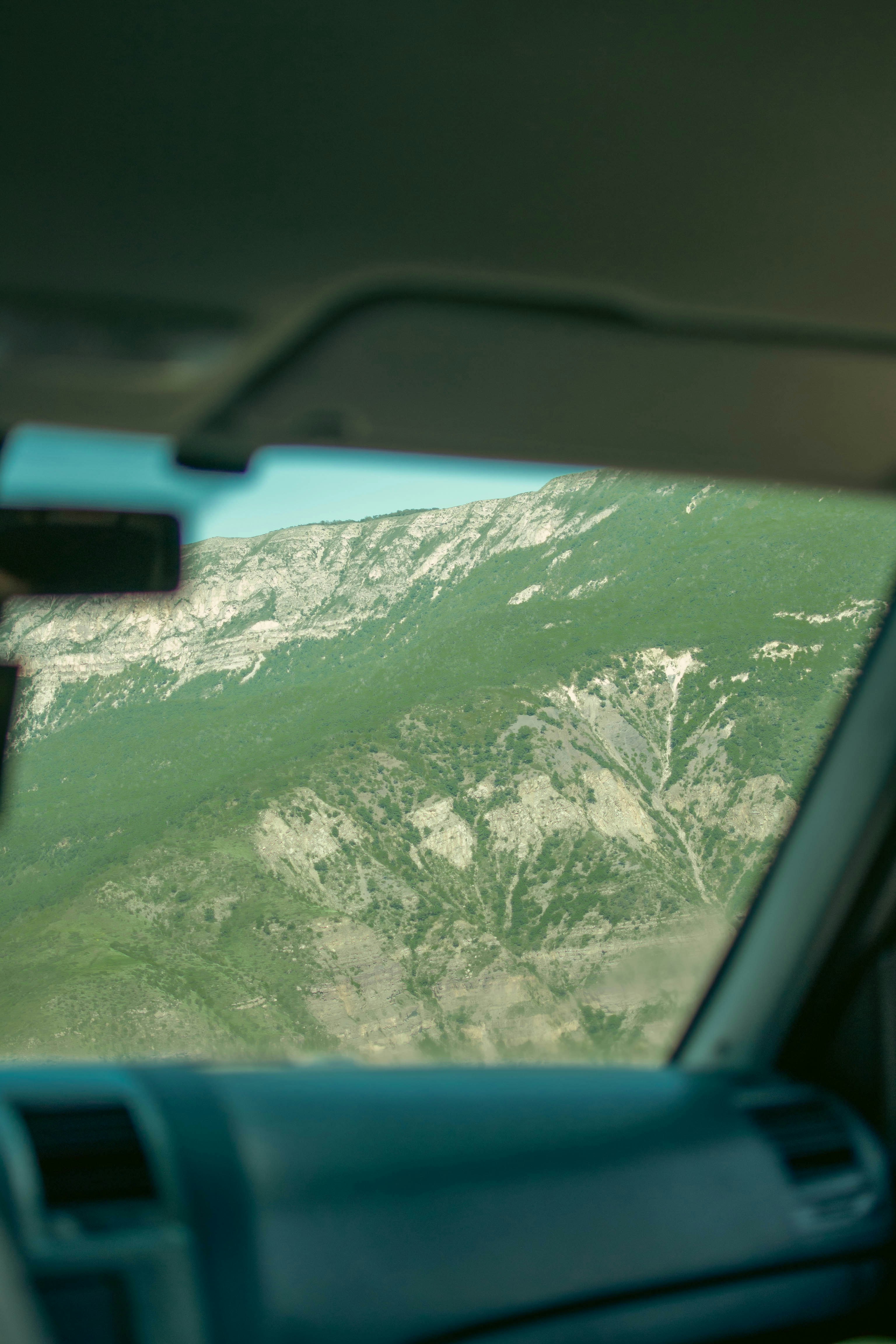 Alpine Ridge Framed by the Car Window