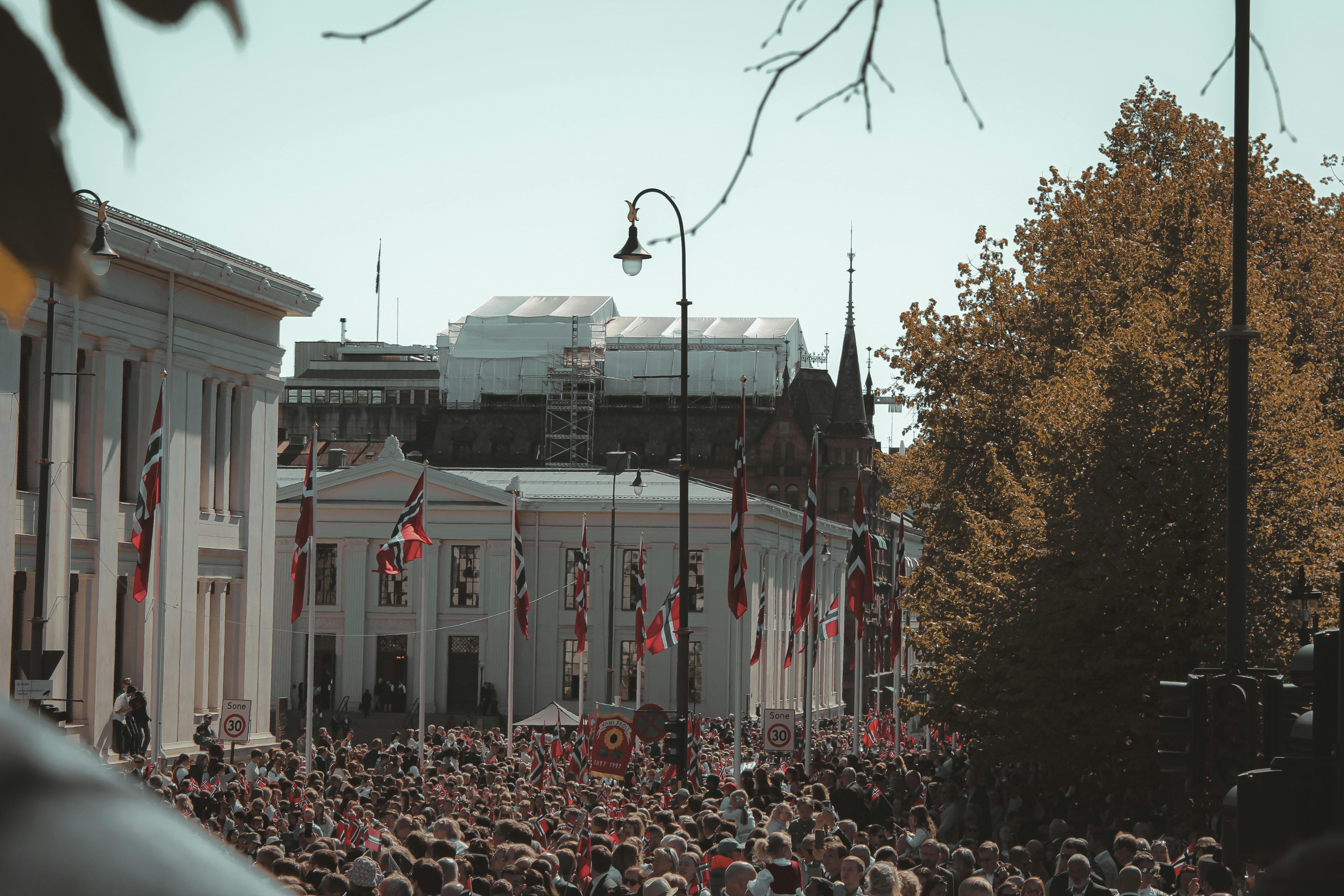 A large crowd of people in front of a building photo – Free Oslo Image ...
