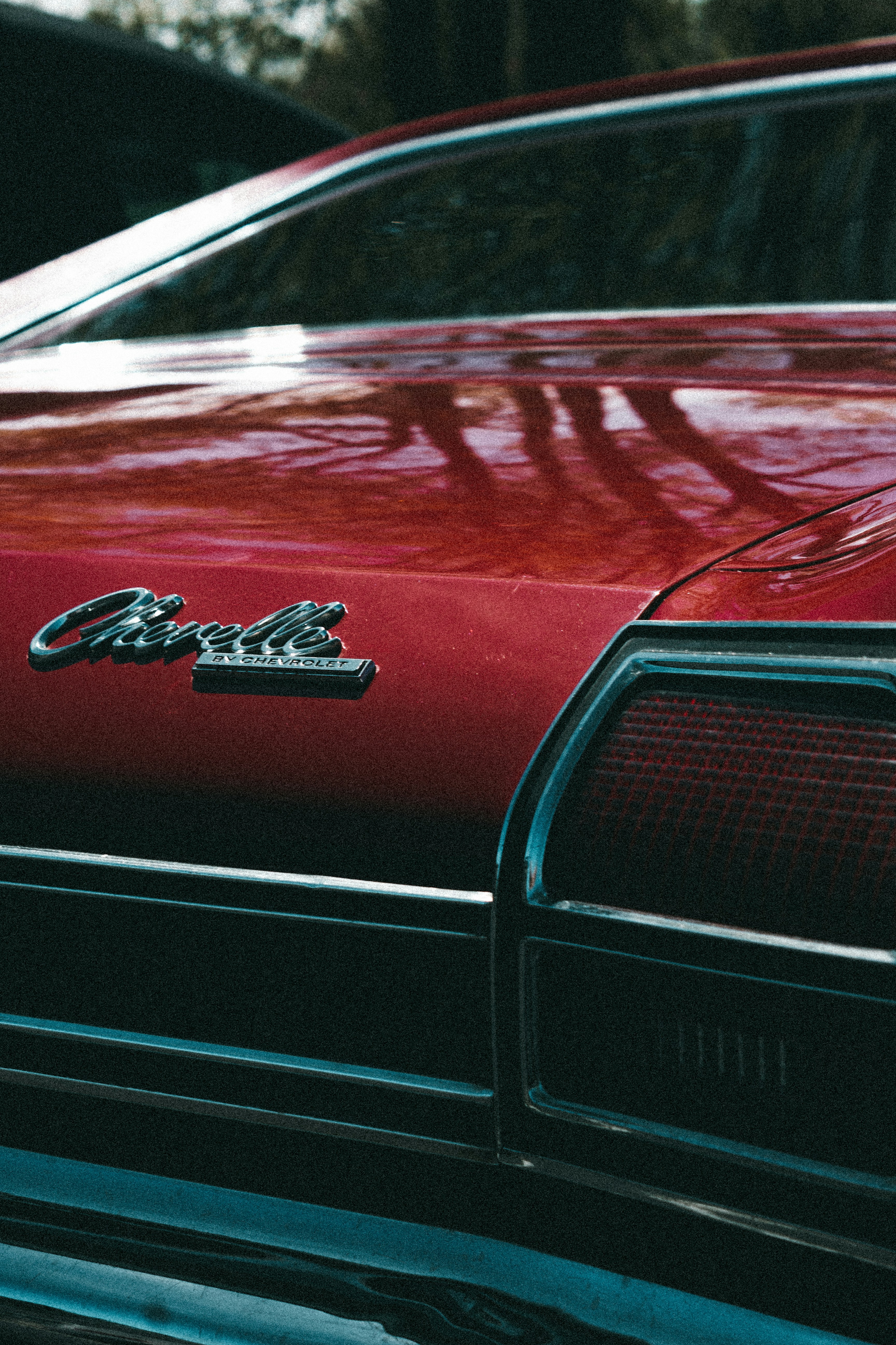 Red Chevrolet Emblem with Classic Car Grille