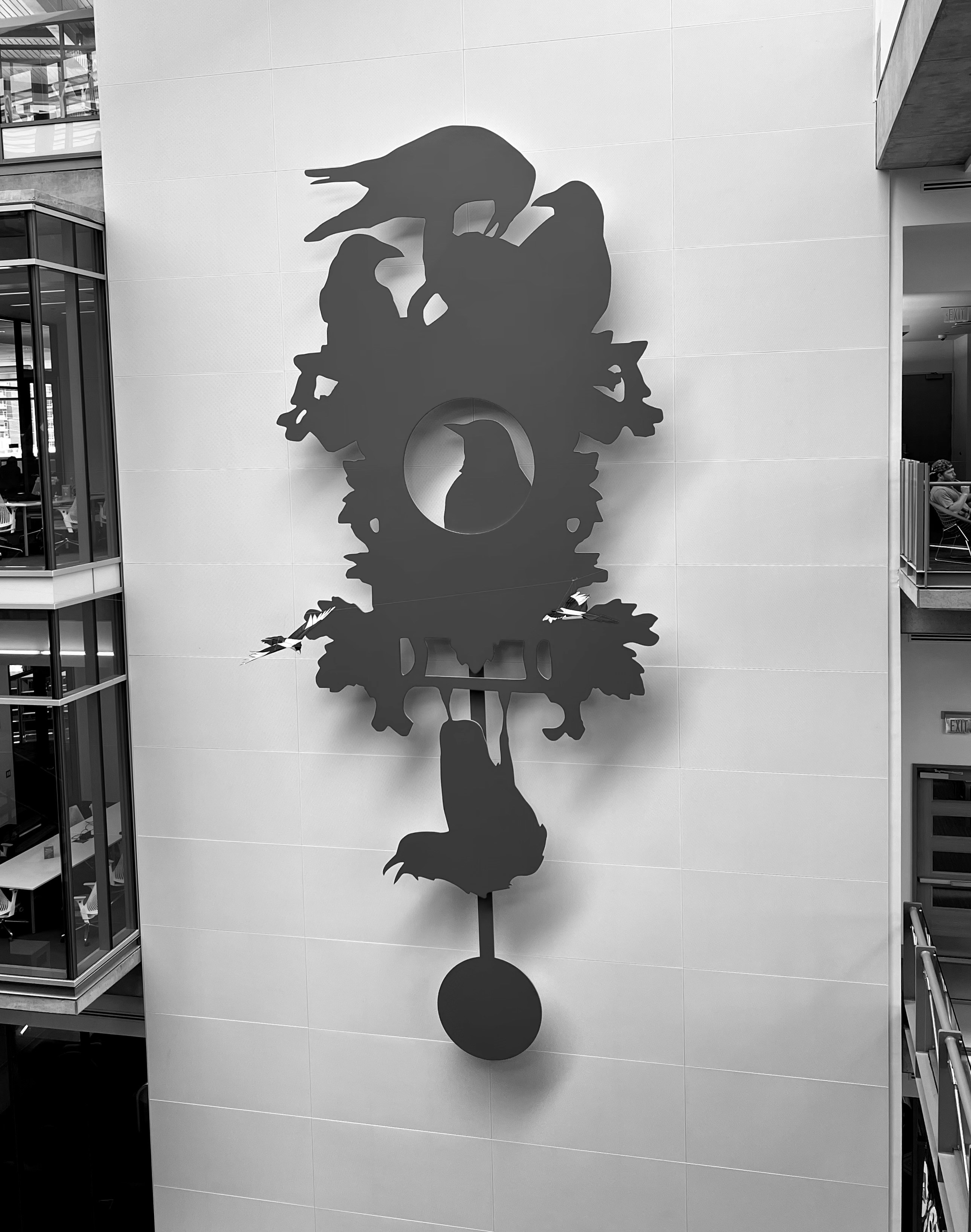 Shadow Machinery: A Monumental Silhouette in a Modern Atrium