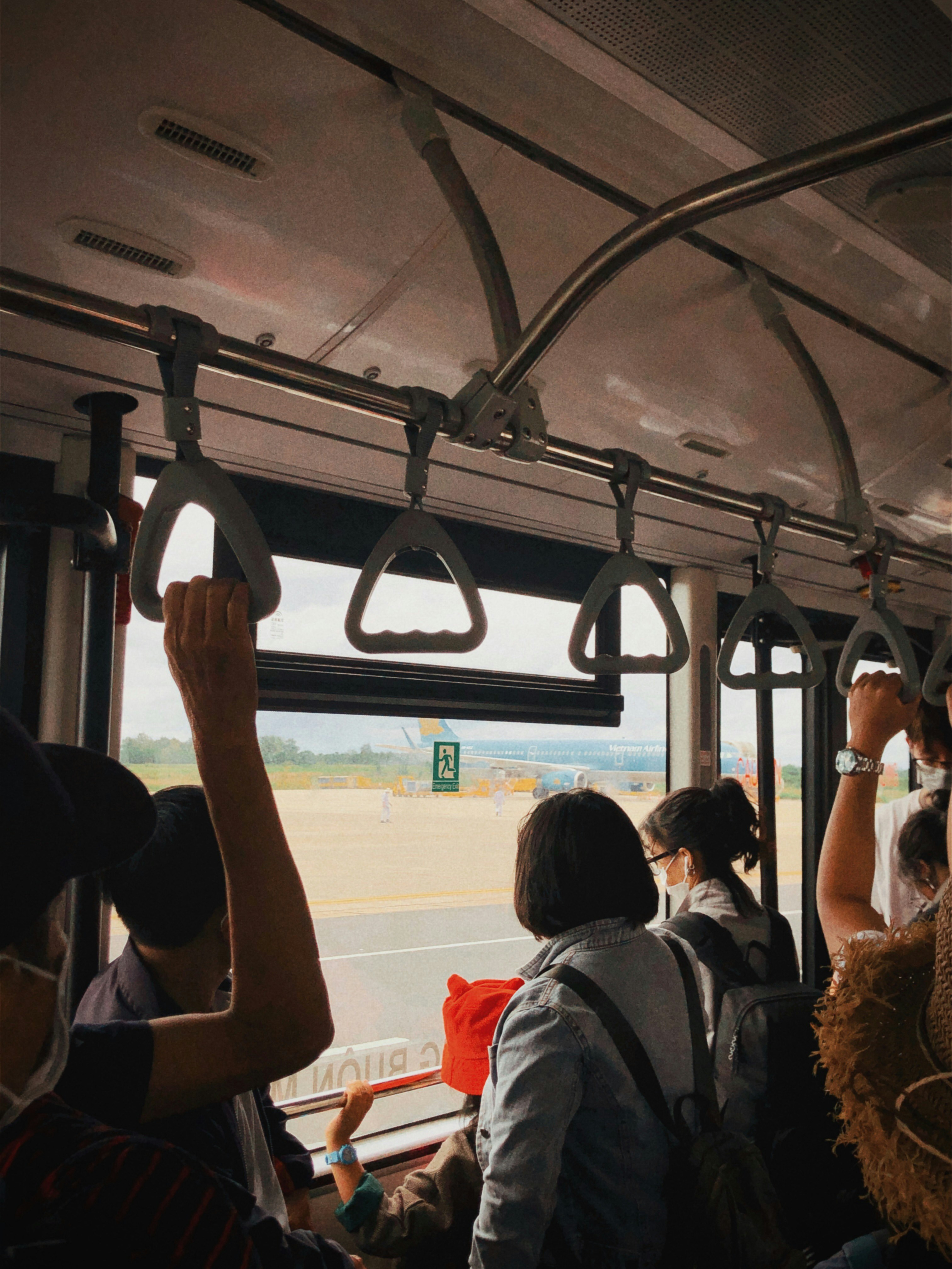 A group of people riding on a bus photo – Free People Image on Unsplash