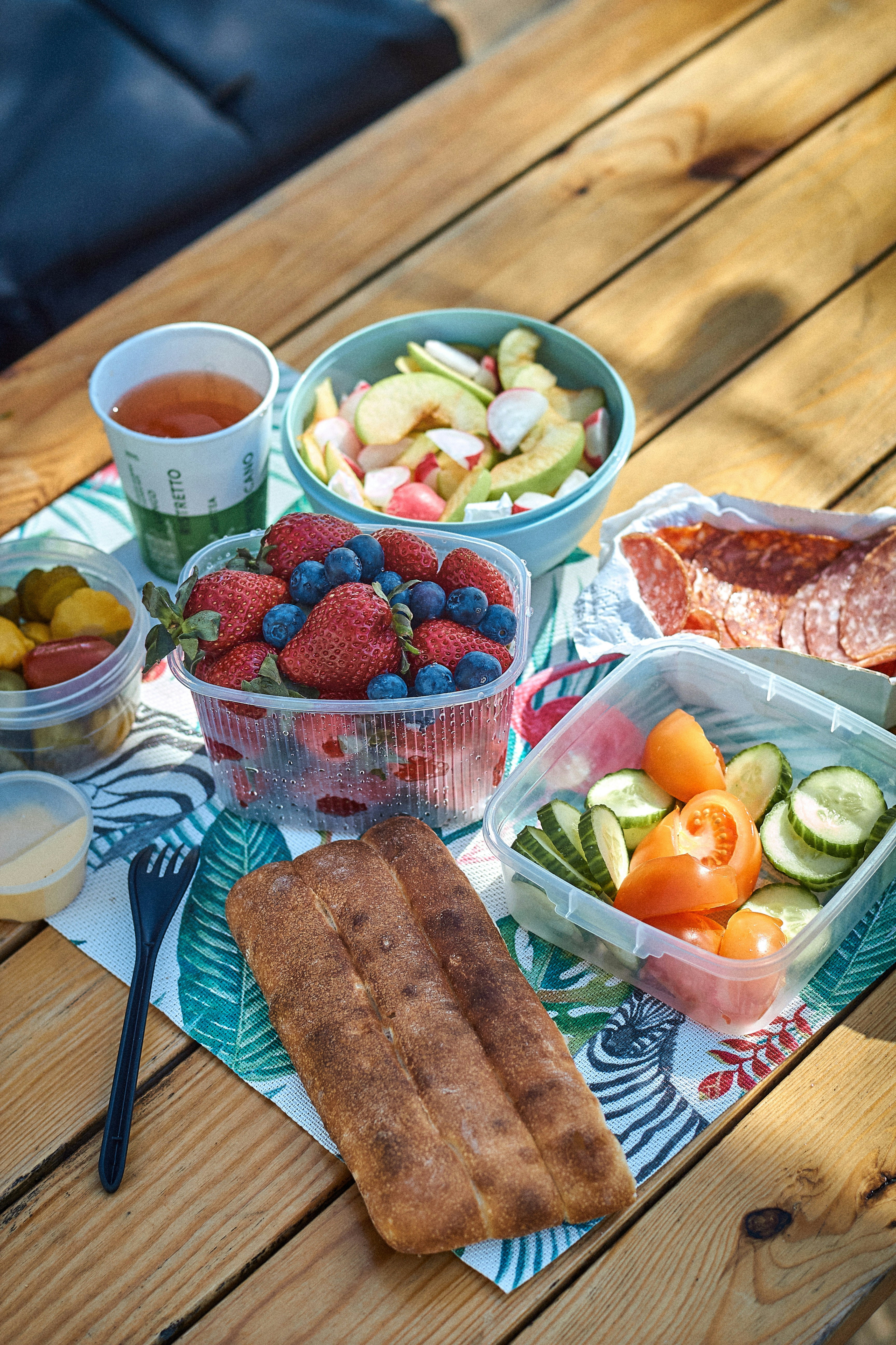 Sunlit Berry Bowl Anchors a Rustic Picnic