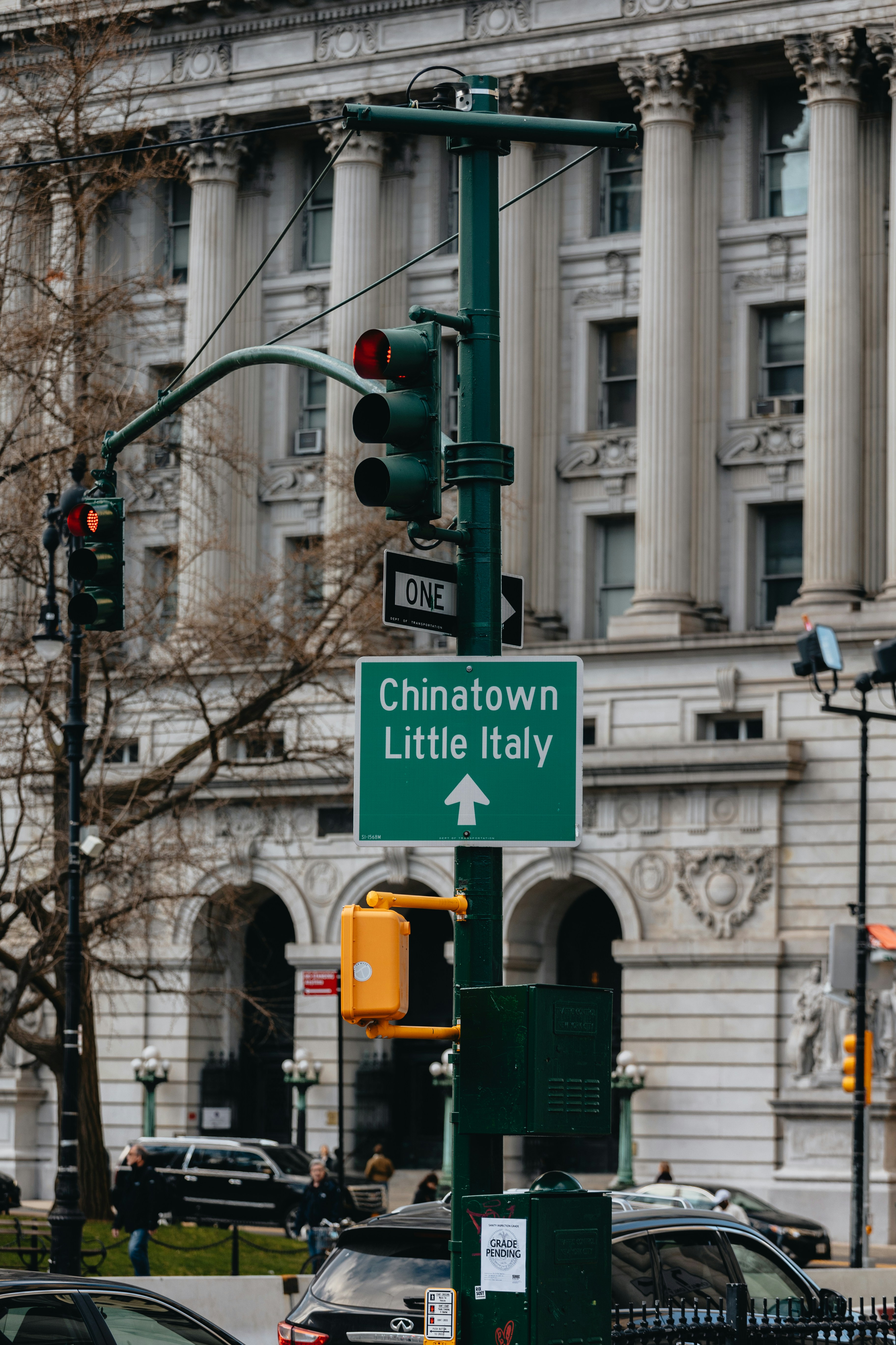 Crossroads Signpost: Chinatown and Little Italy Under a Neoclassical Facade