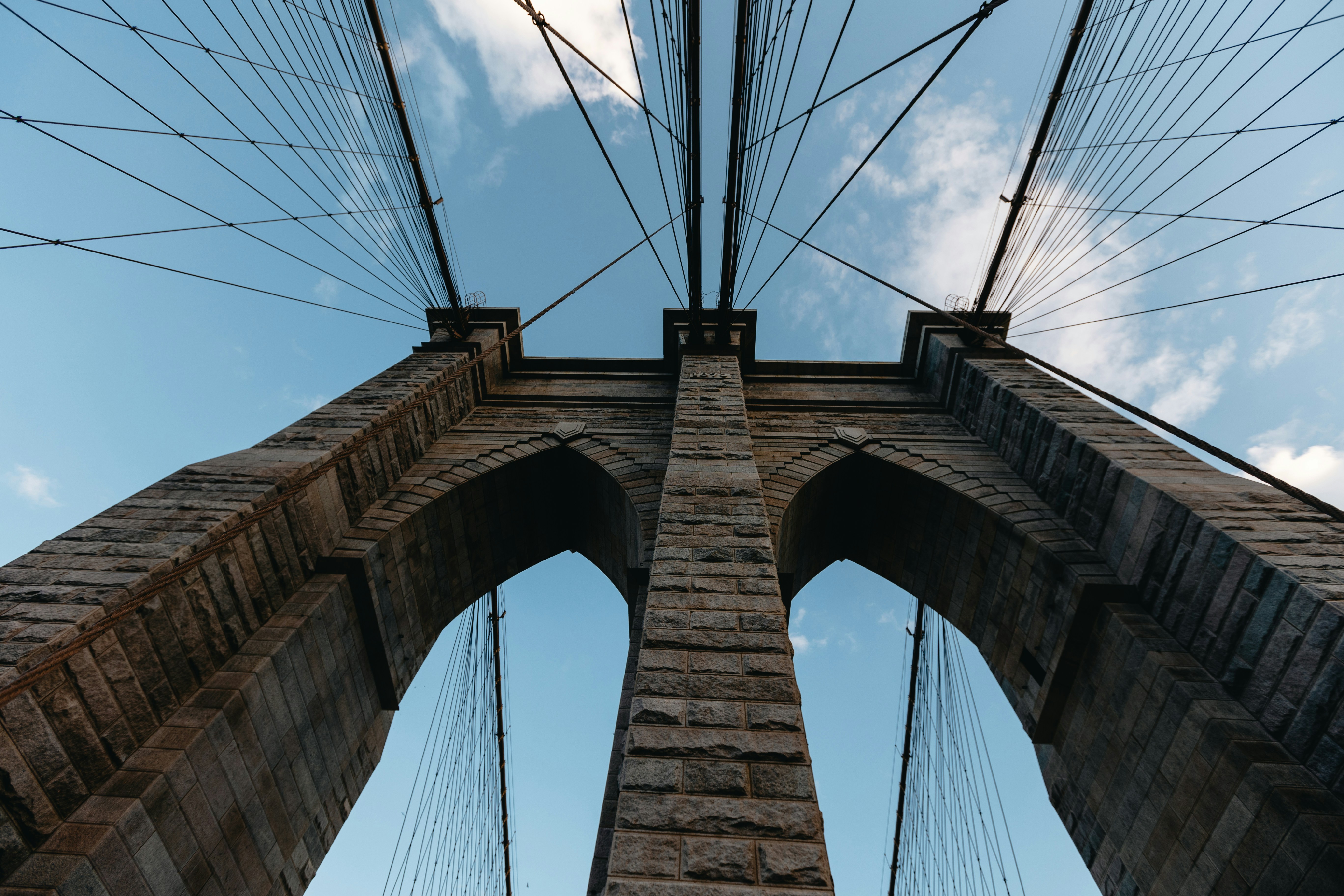 A view of the top of a bridge from below photo – Free Bridge Image on ...
