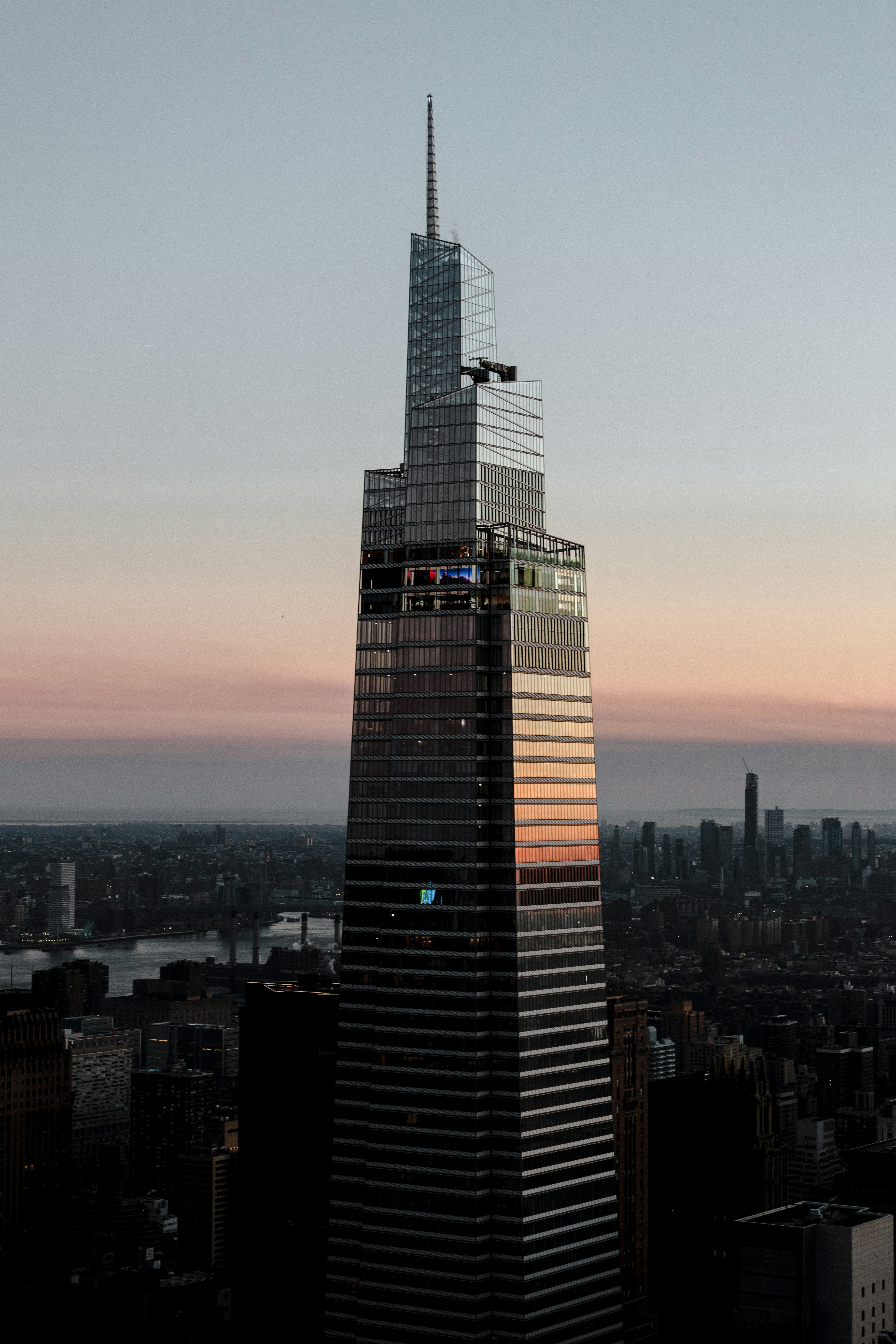 Skyline Spire at Dusk: A Glass Tower Ascending