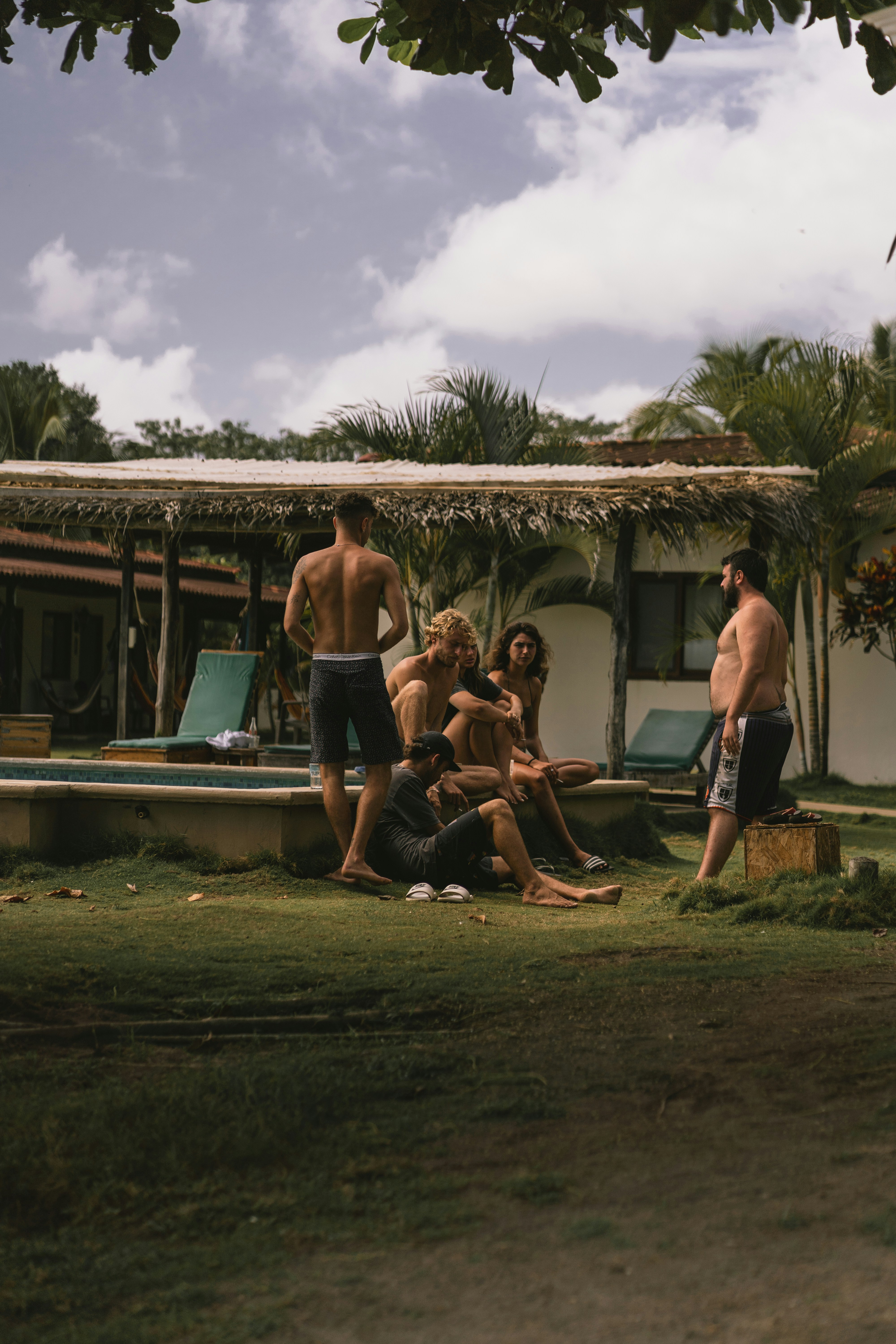 A group of people sitting around a pool photo – Free Panama Image on ...