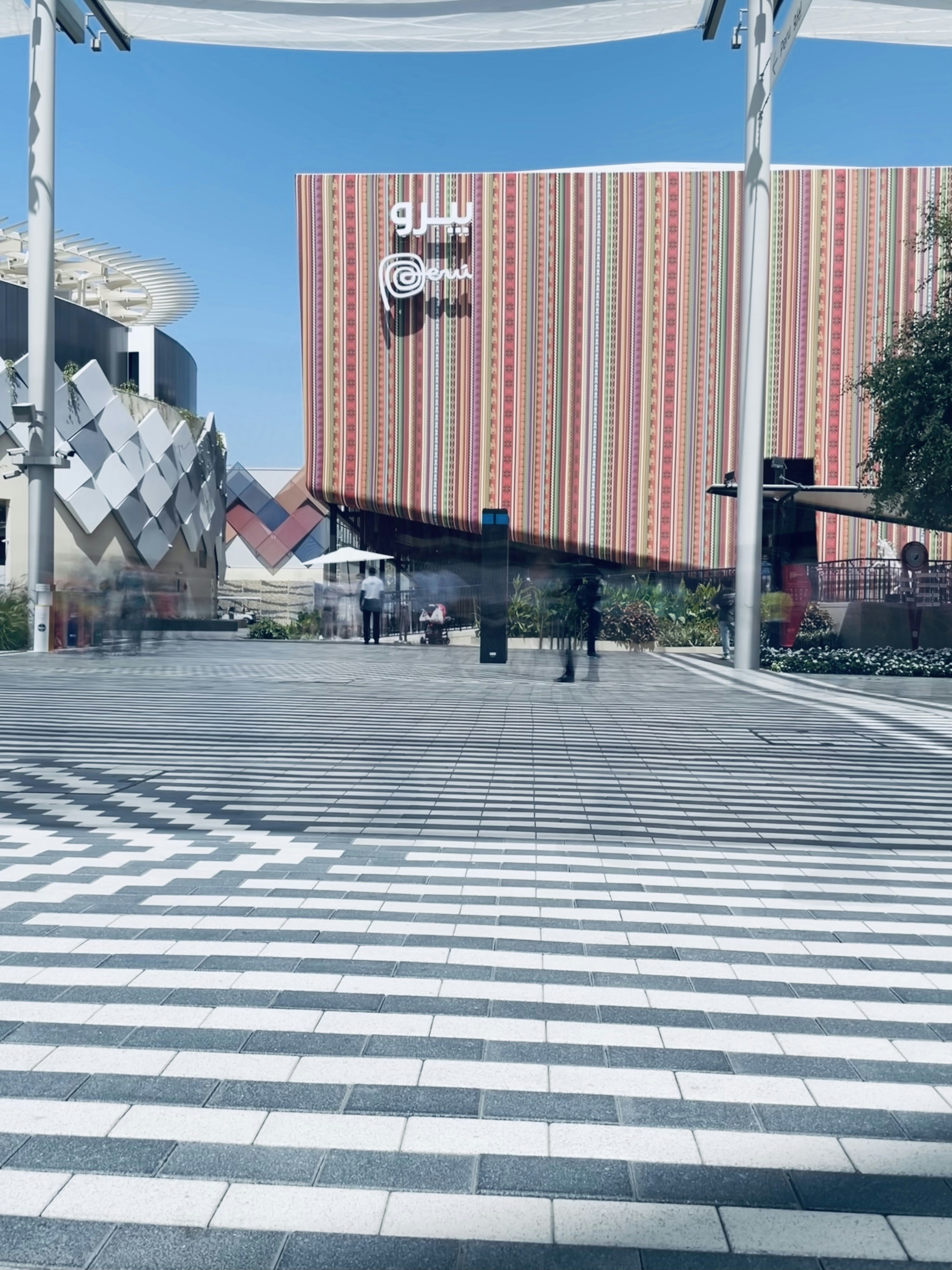 A large building that has a large checkerboard pattern on it photo ...