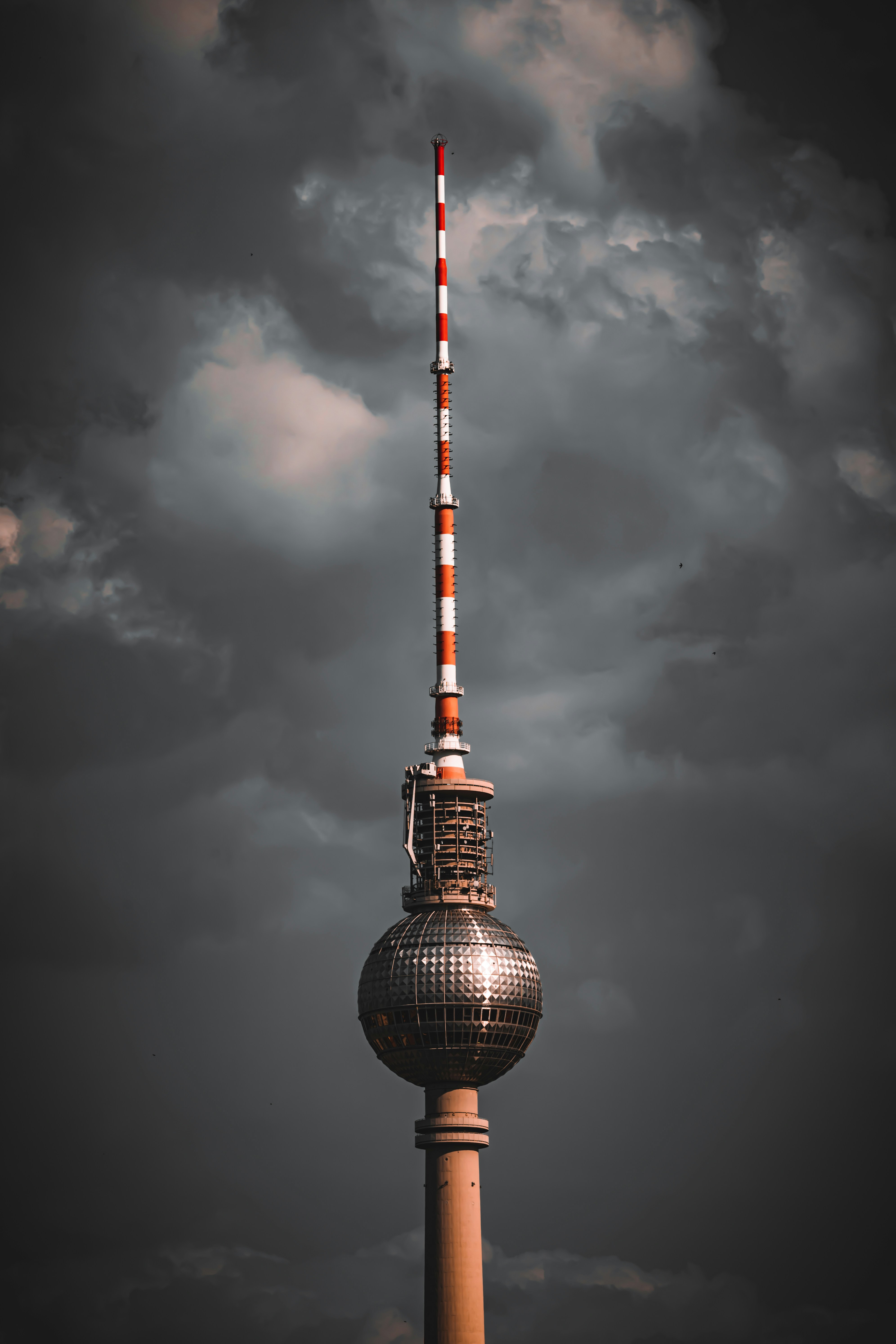A tall tower with a red and white striped top photo – Free Berlin Image ...