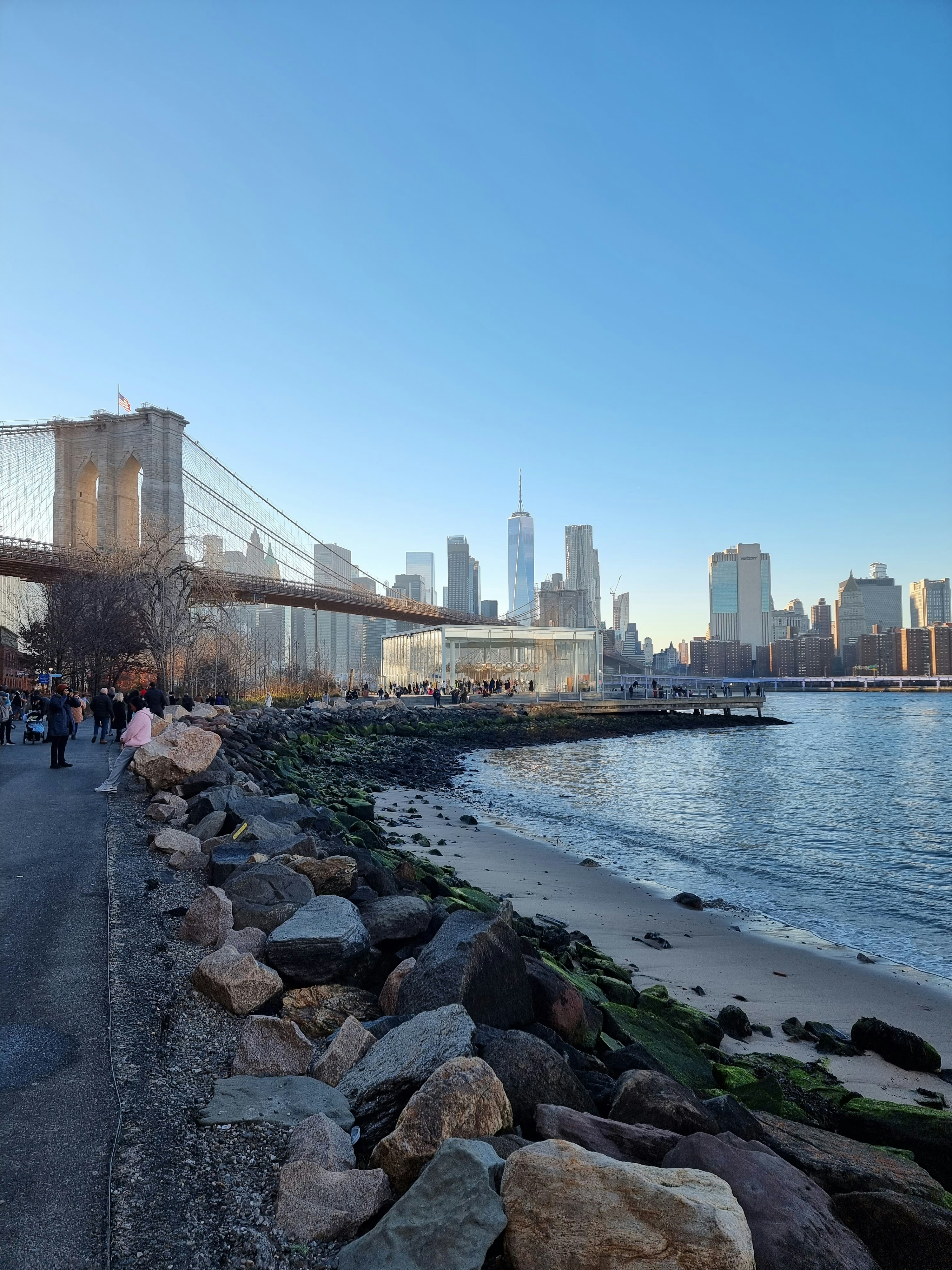 Riverside Horizon: Brooklyn Bridge Framing the Manhattan Skyline