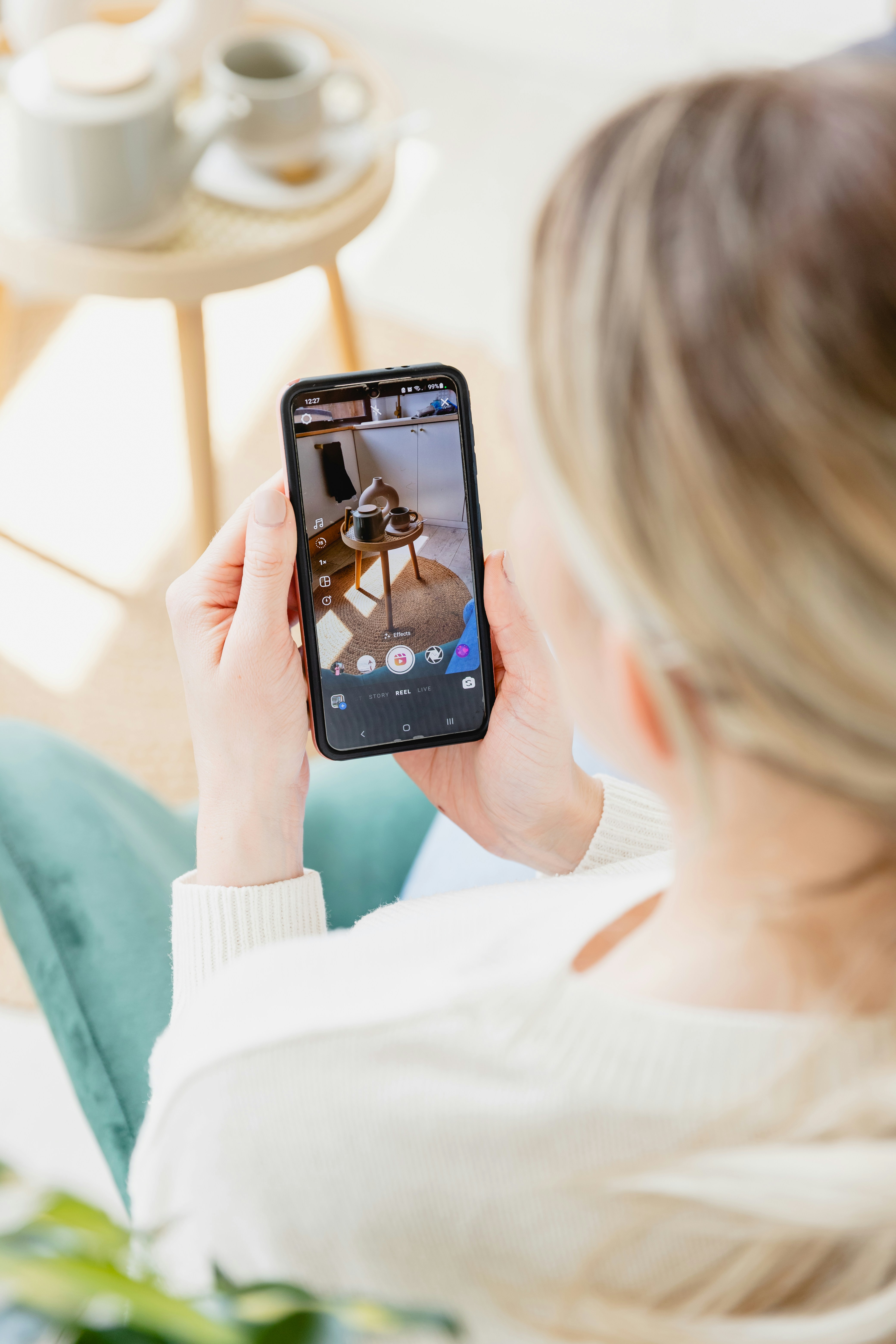 Tea Time in a Handheld Frame: A Cozy Still Life Through a Phone Screen